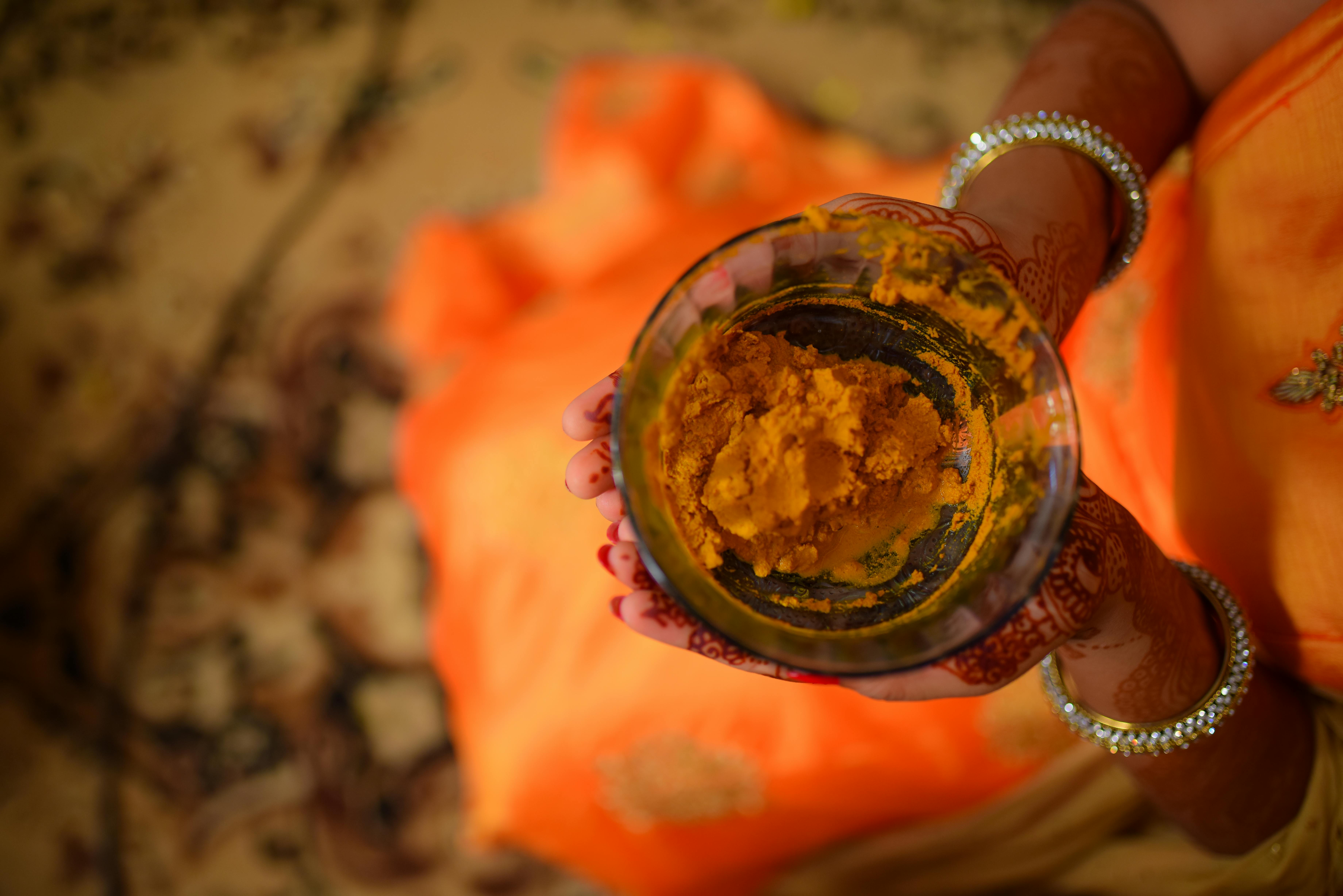 Hands Holding Food in Glass · Free Stock Photo