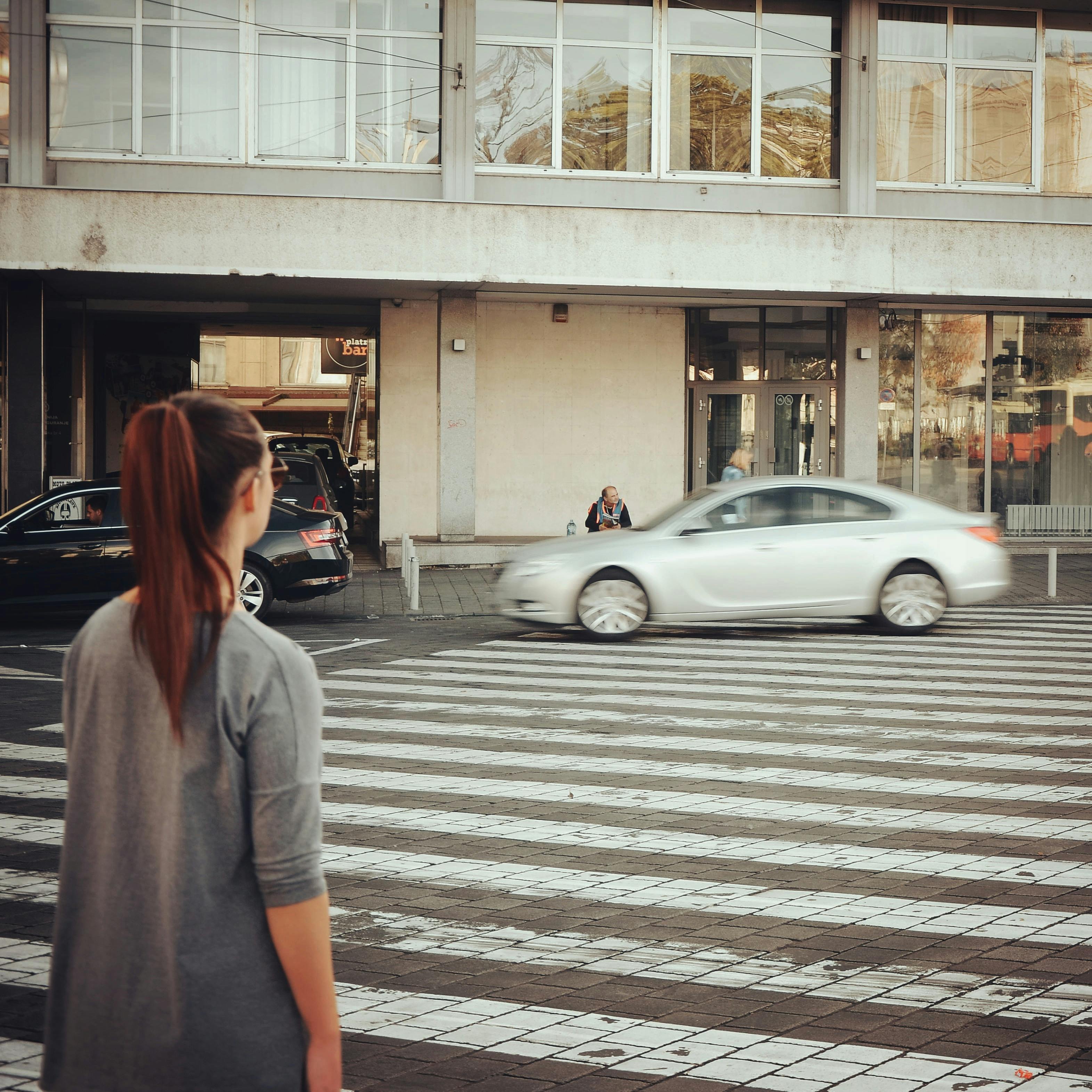 Woman on the Crossroad · Free Stock Photo