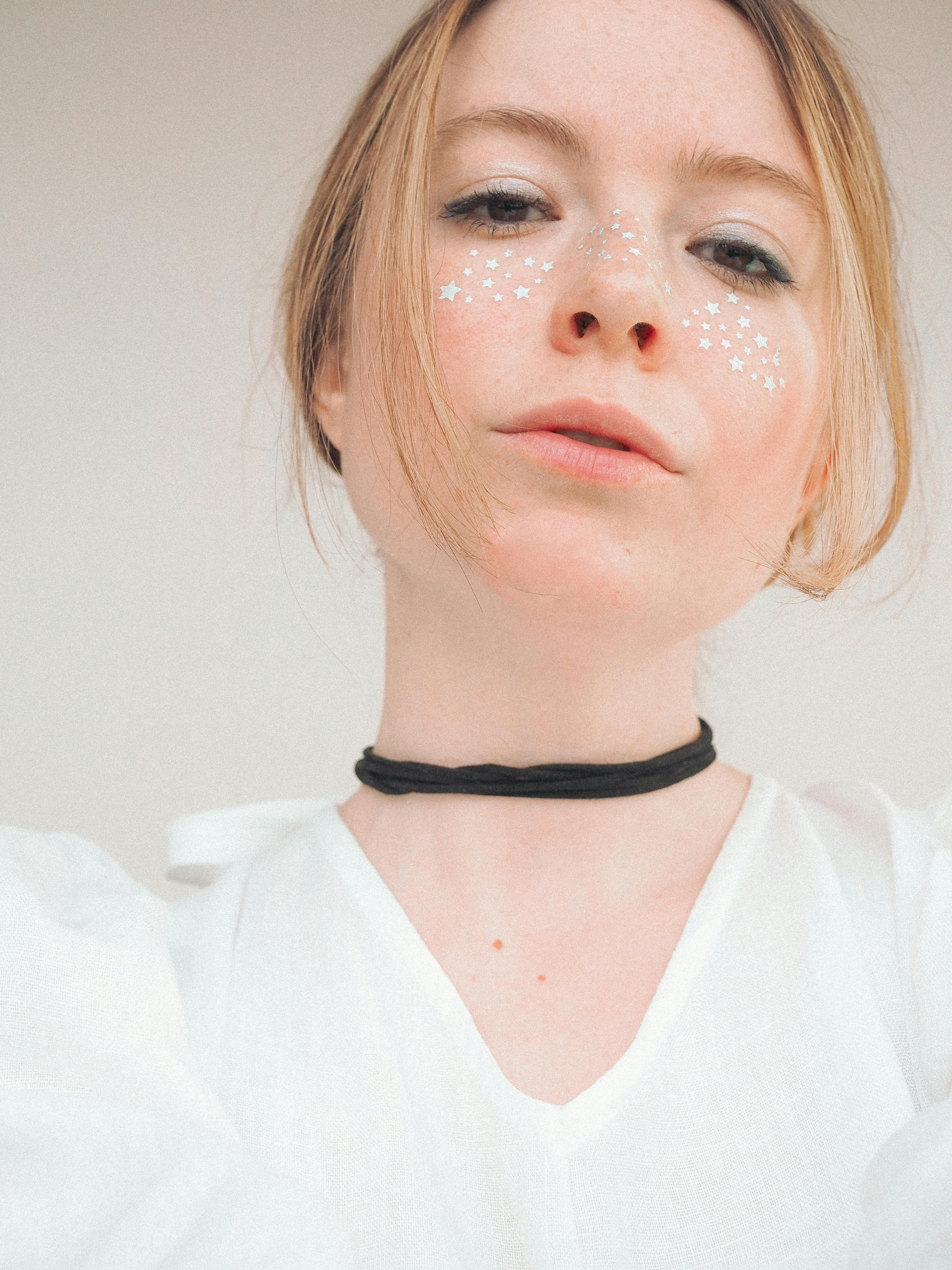 Beautiful Woman with Stars on Face · Free Stock Photo