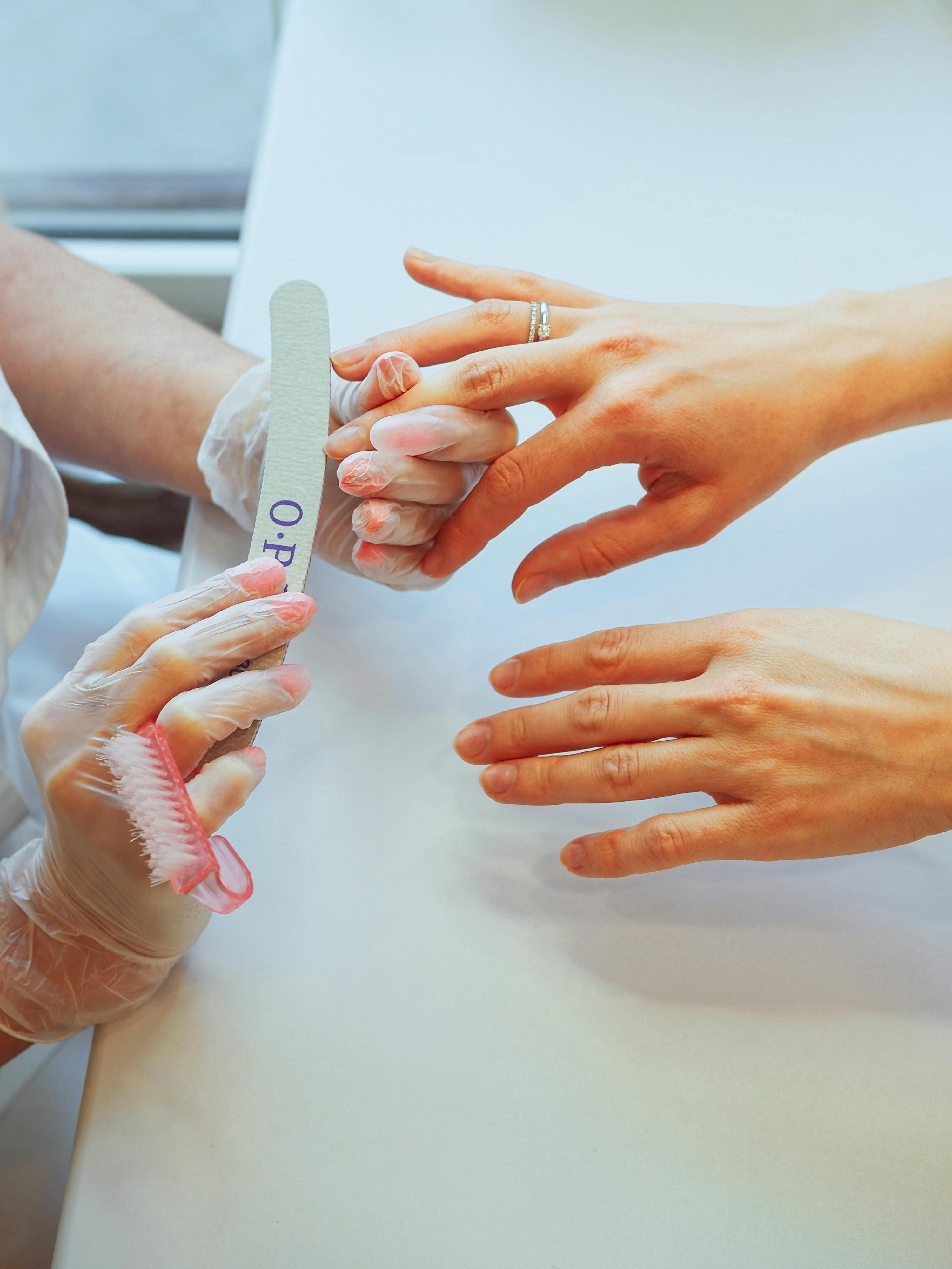 A Person Doing a Manicure · Free Stock Photo