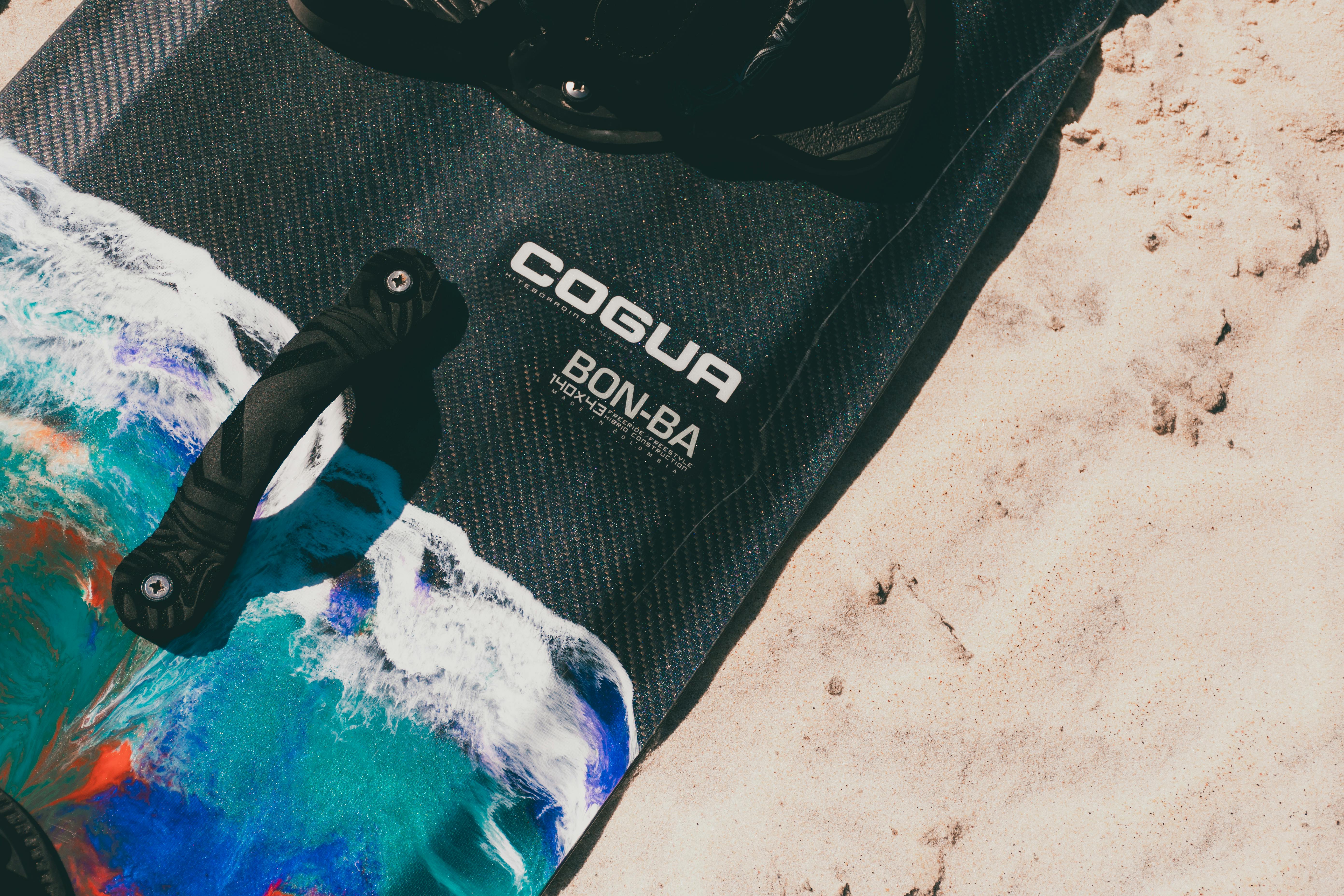 Handle on Board on Beach · Free Stock Photo