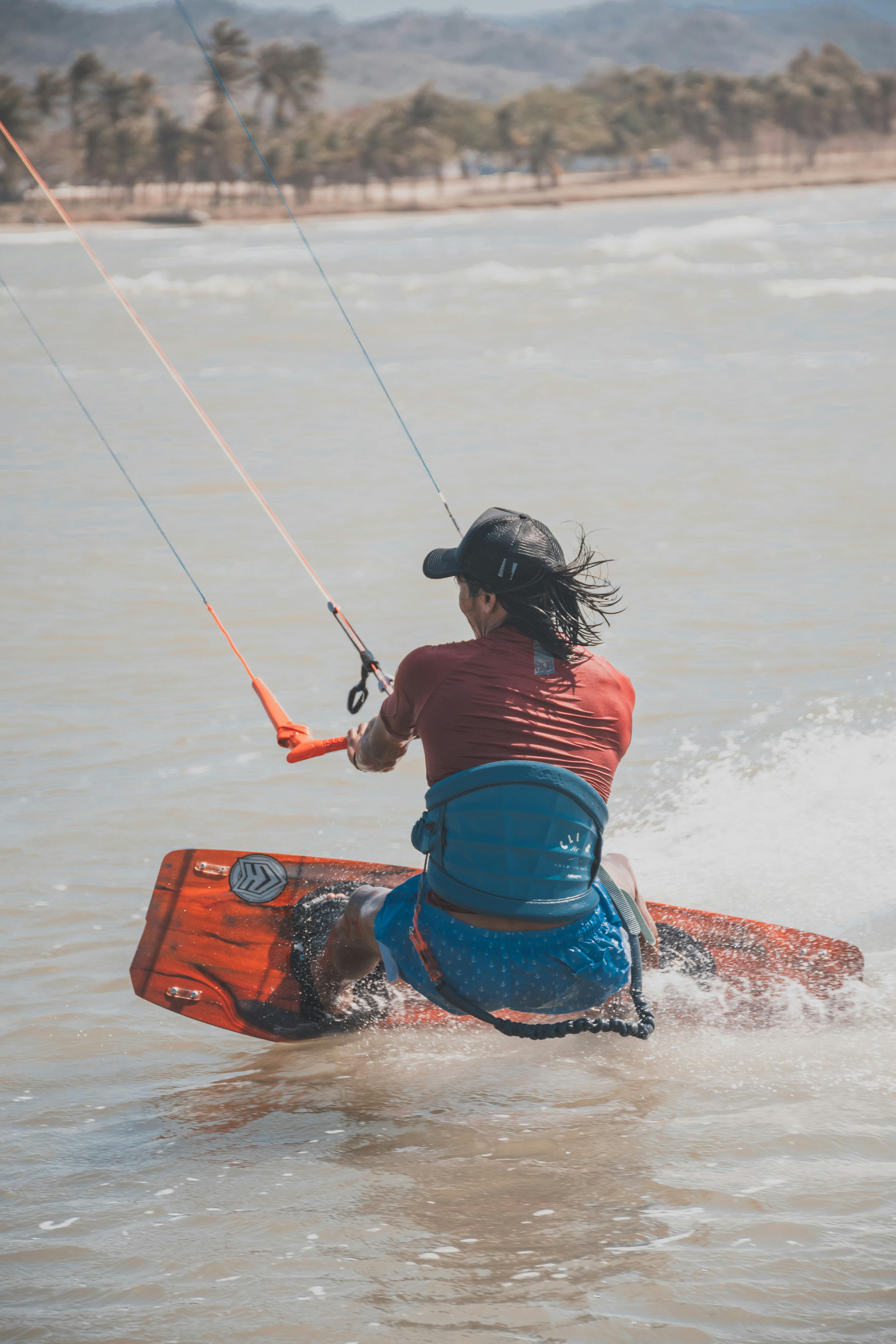 A Woman Kiteboarding · Free Stock Photo