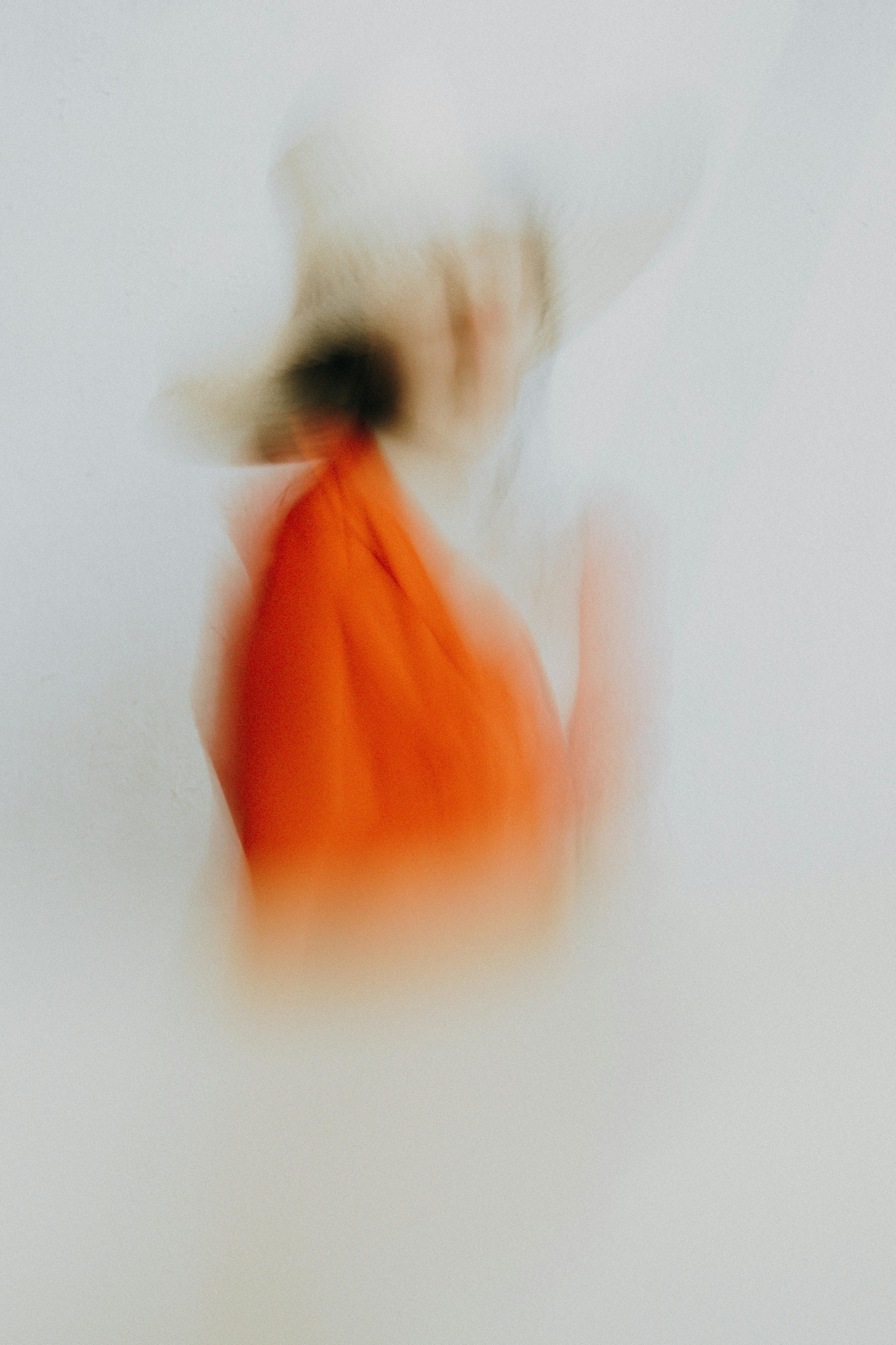 Blurred Woman with Hat · Free Stock Photo
