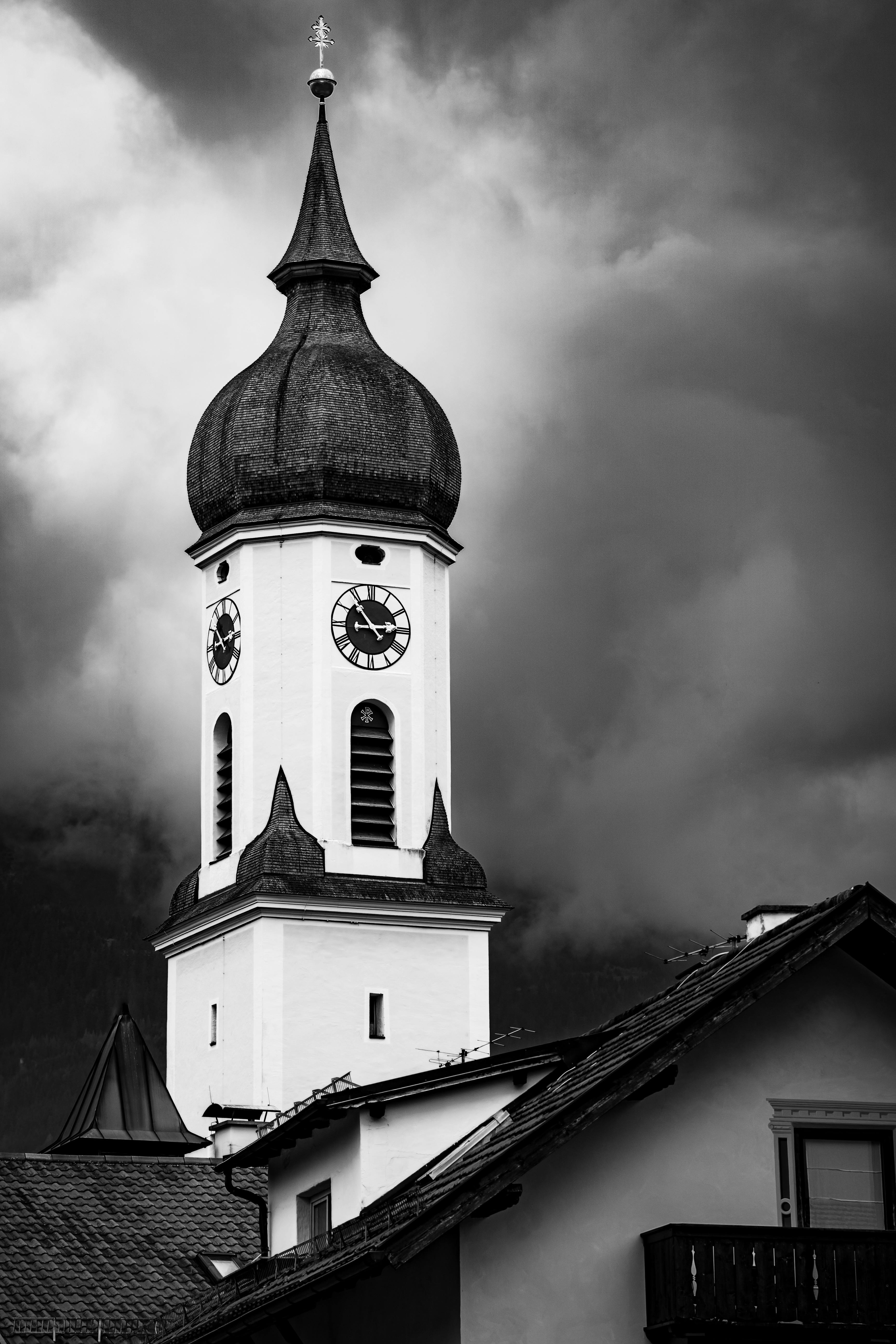 Elegant Facade with Clock Tower in Black and White · Free Stock Photo