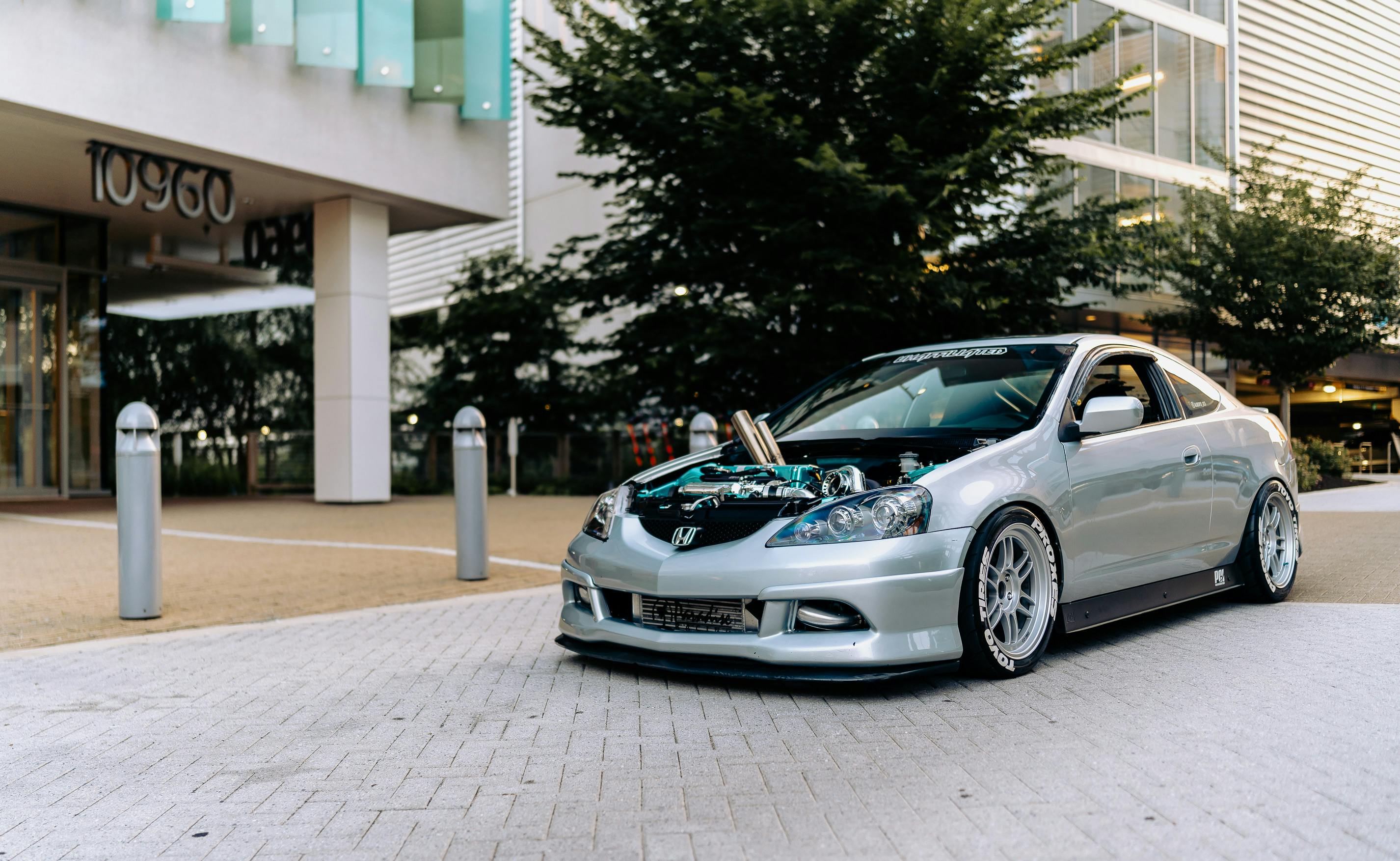 Modern Car Parked outside a Building · Free Stock Photo