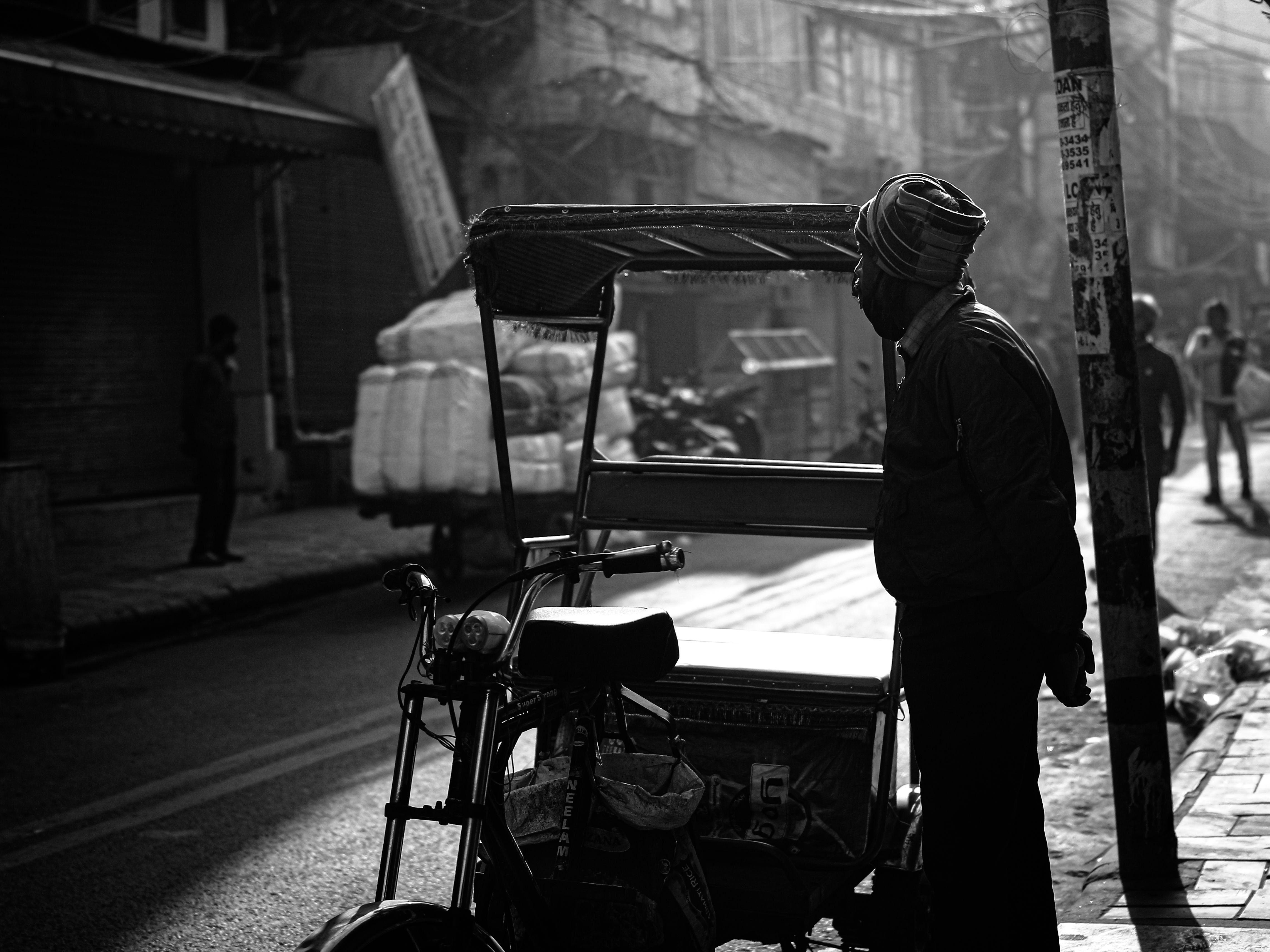Man Selling on Street Market · Free Stock Photo