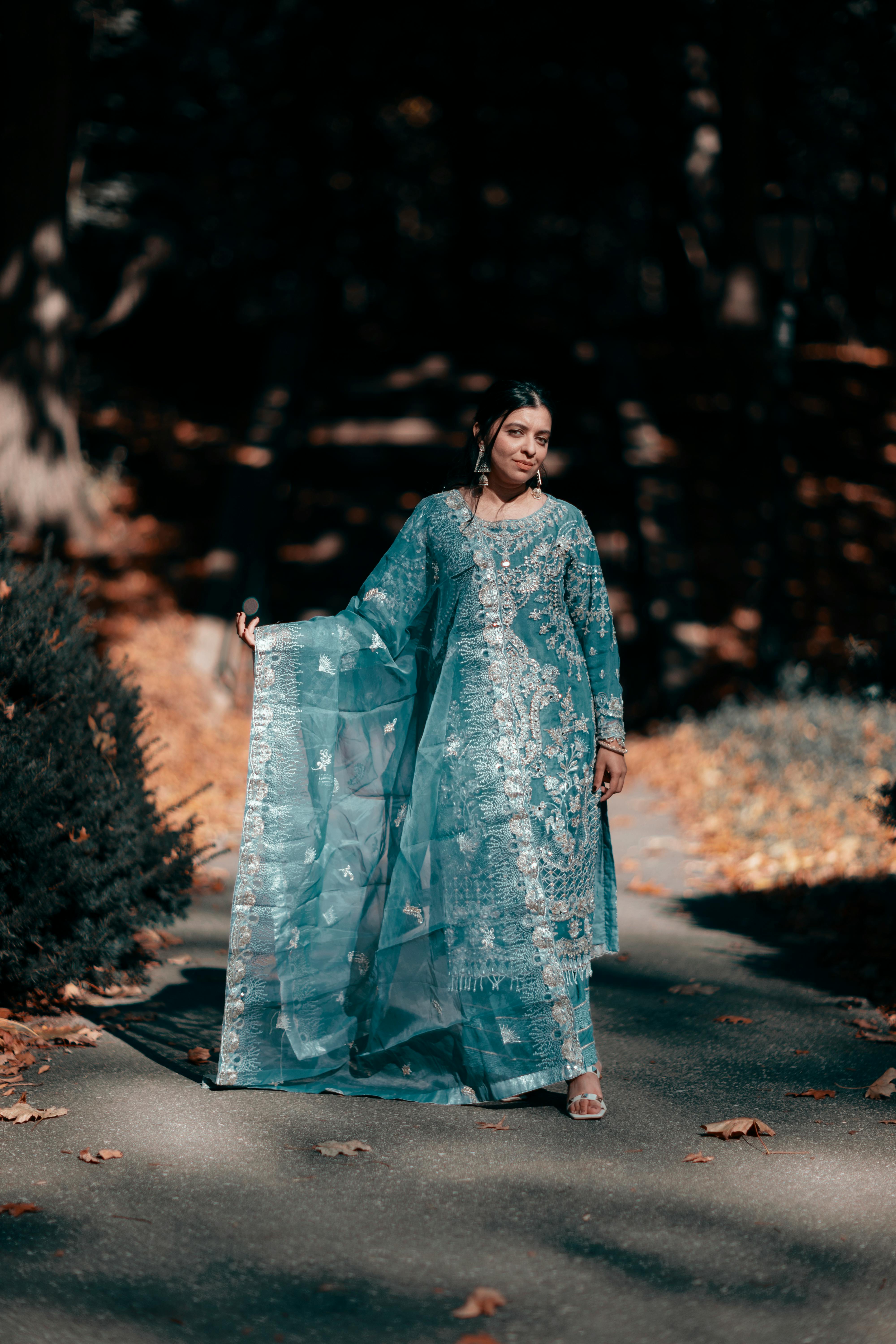 Beautiful Woman in Traditional Clothing · Free Stock Photo