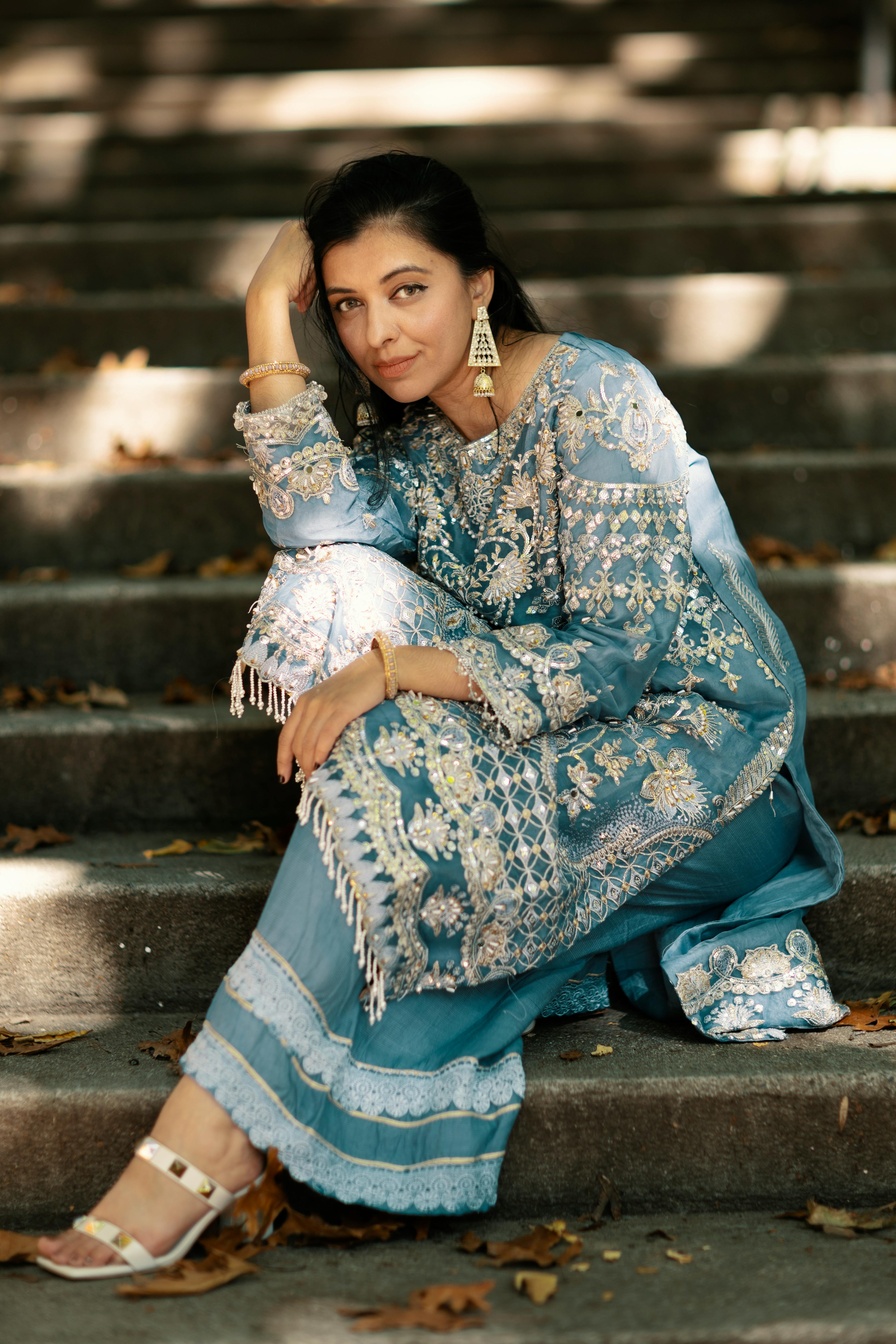 Woman in Traditional Clothing Indoors · Free Stock Photo