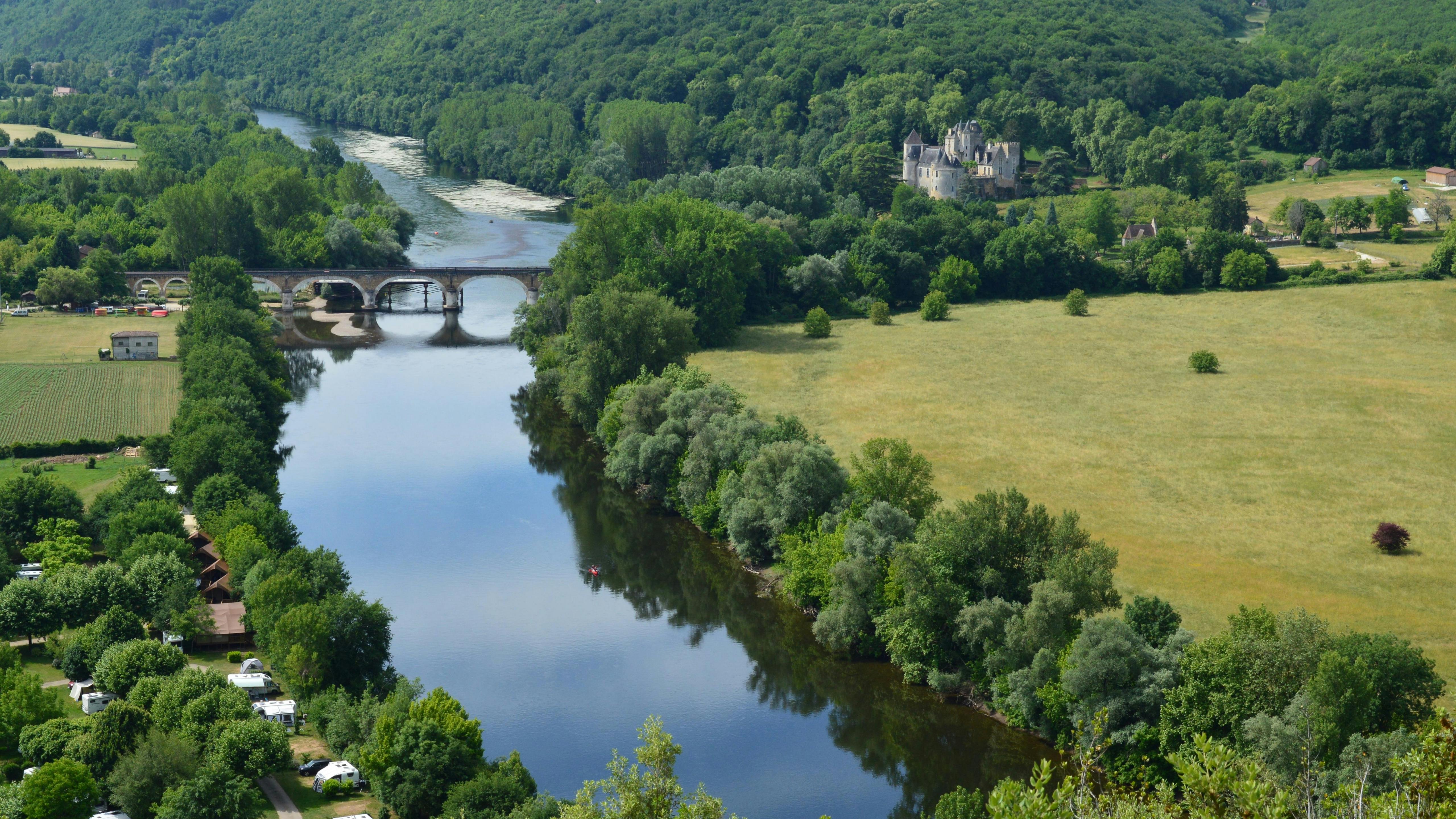River Flowing in Green Countryside · Free Stock Photo