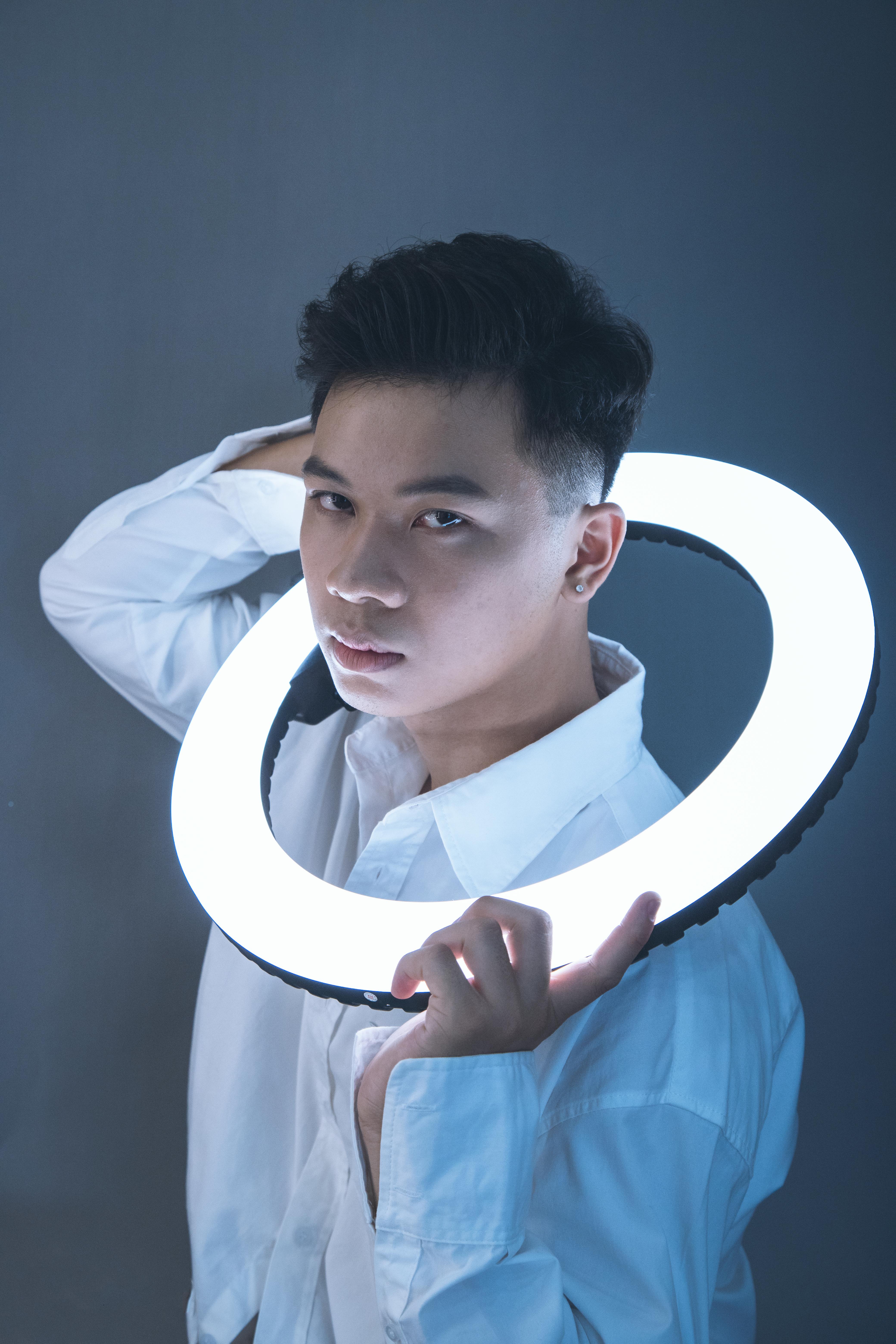 A Ring Light around the Neck of a Man in a White Dress Shirt · Free ...