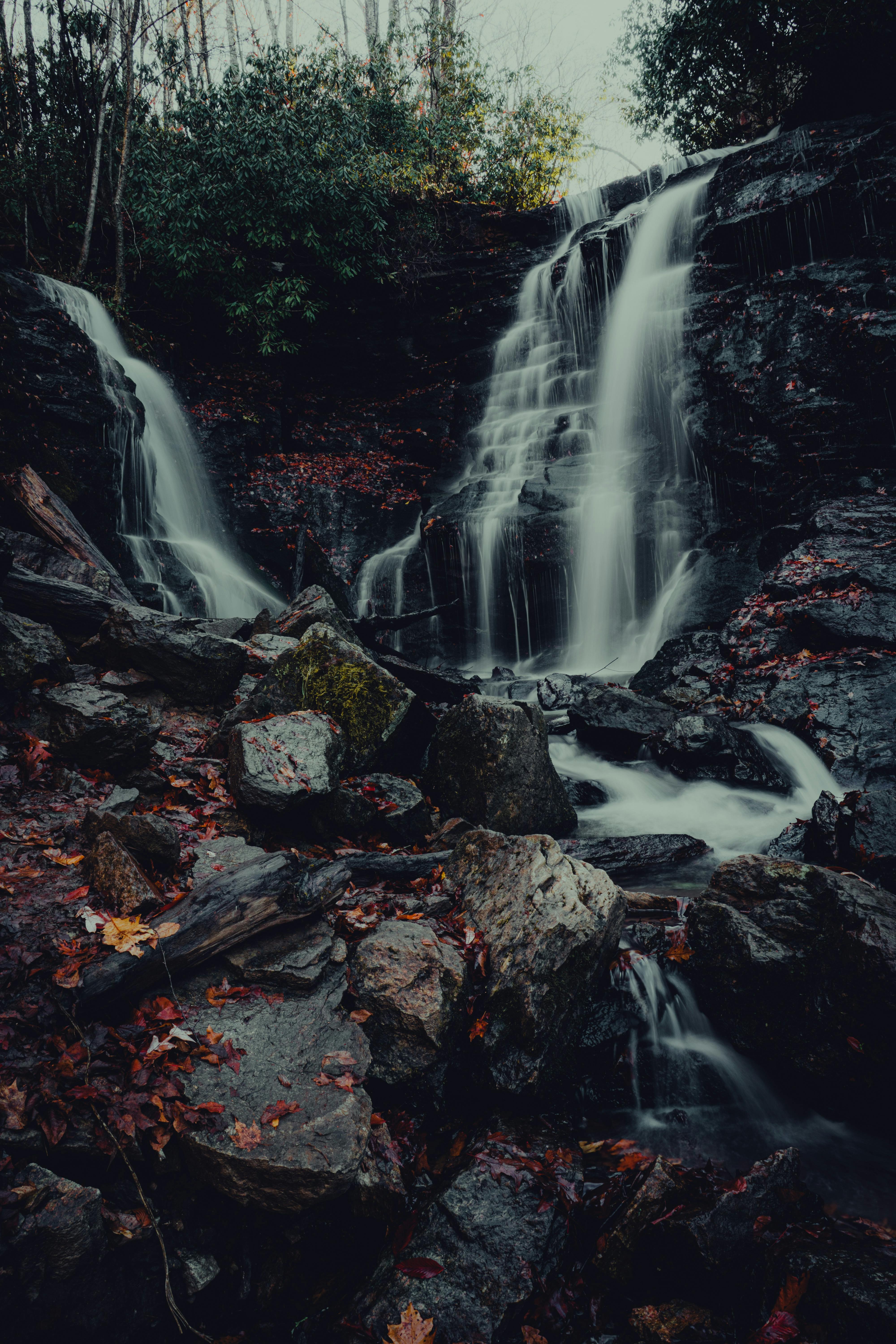 Waterfall on Rock Formation · Free Stock Photo