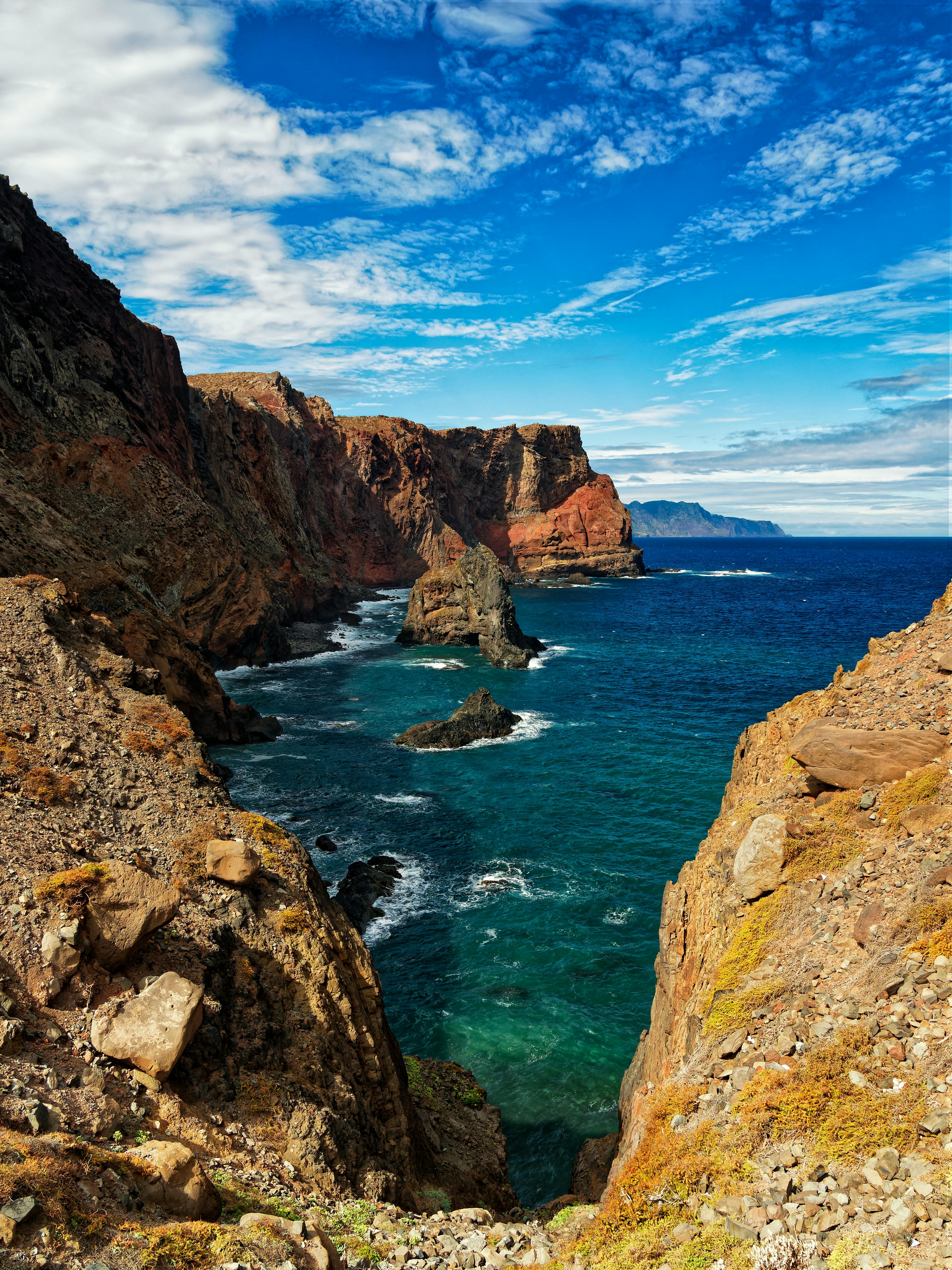 Rock Cliff Beside the Ocean · Free Stock Photo