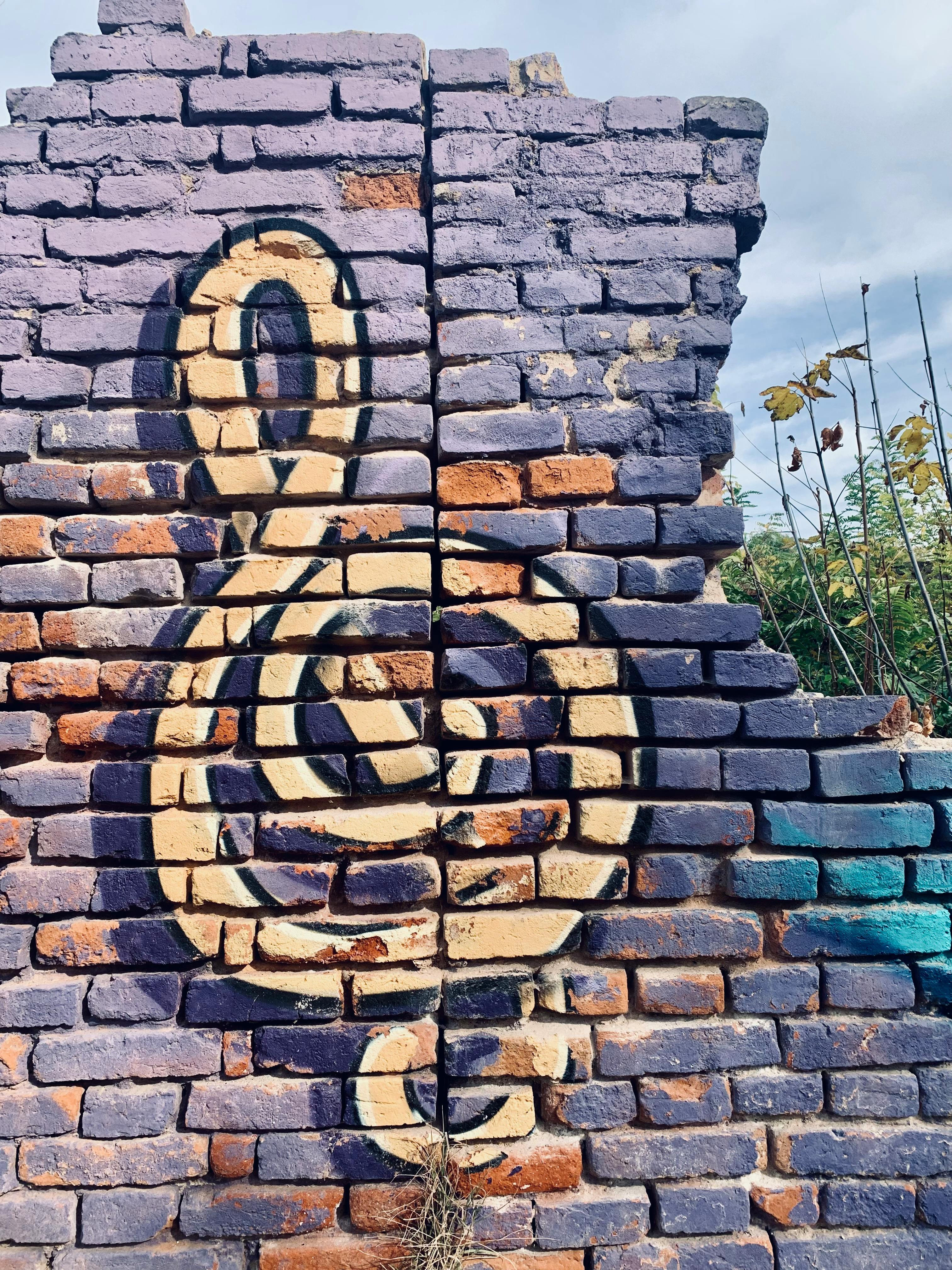 Mural on Brick Wall · Free Stock Photo