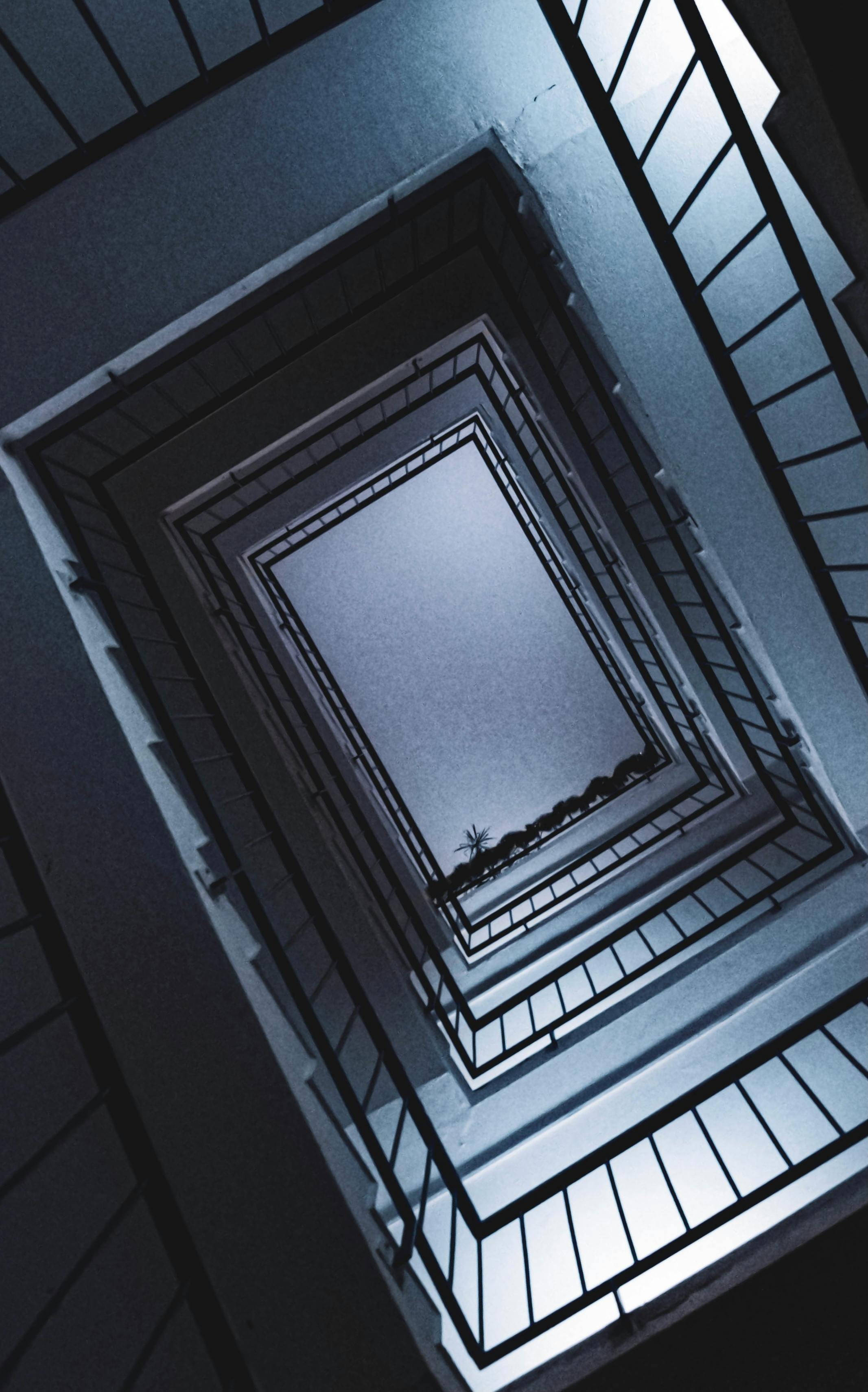 Person Hanging on a High Rise Building · Free Stock Photo