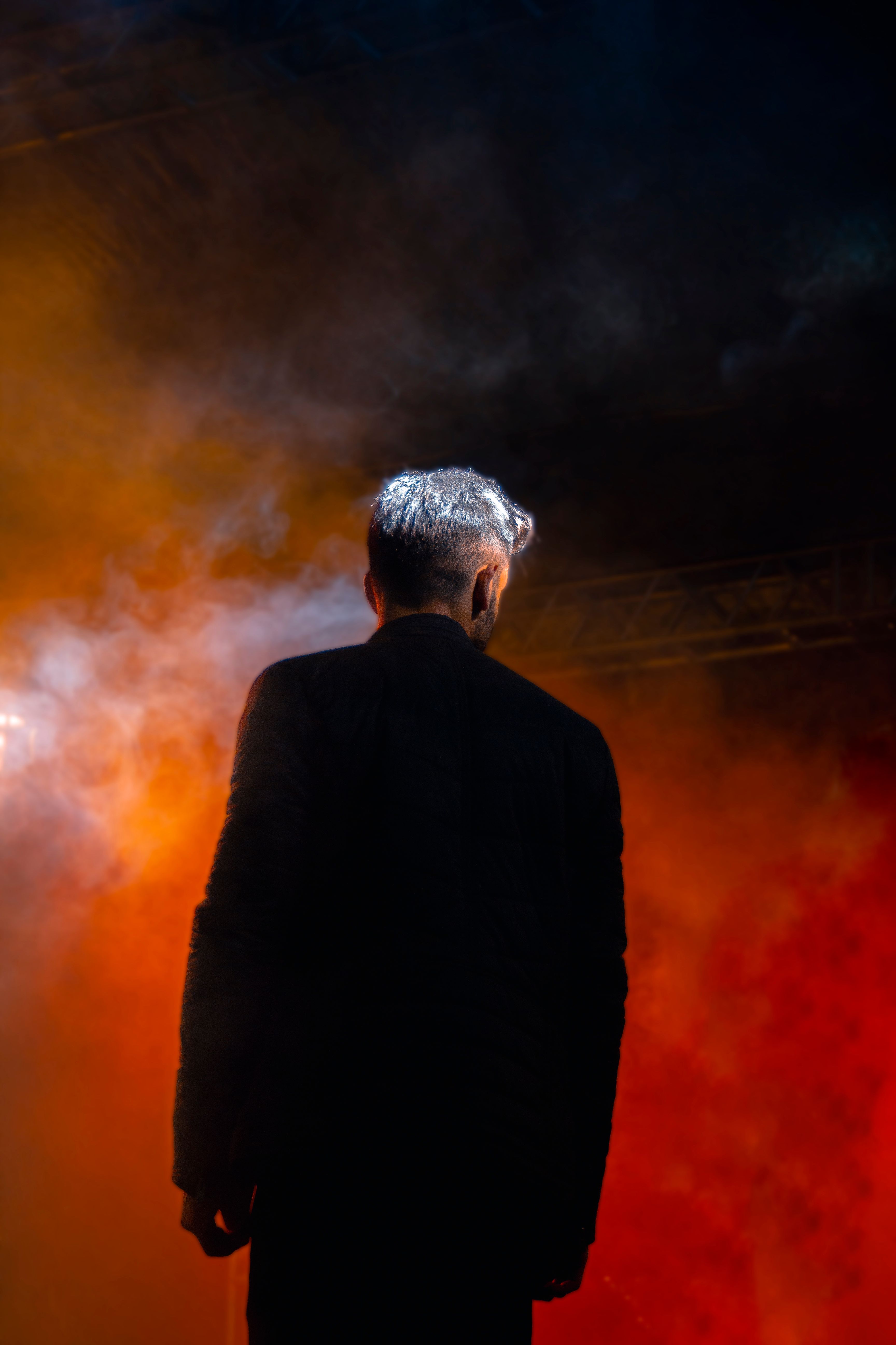 Back View of a Man Wearing Black Long Sleeves · Free Stock Photo