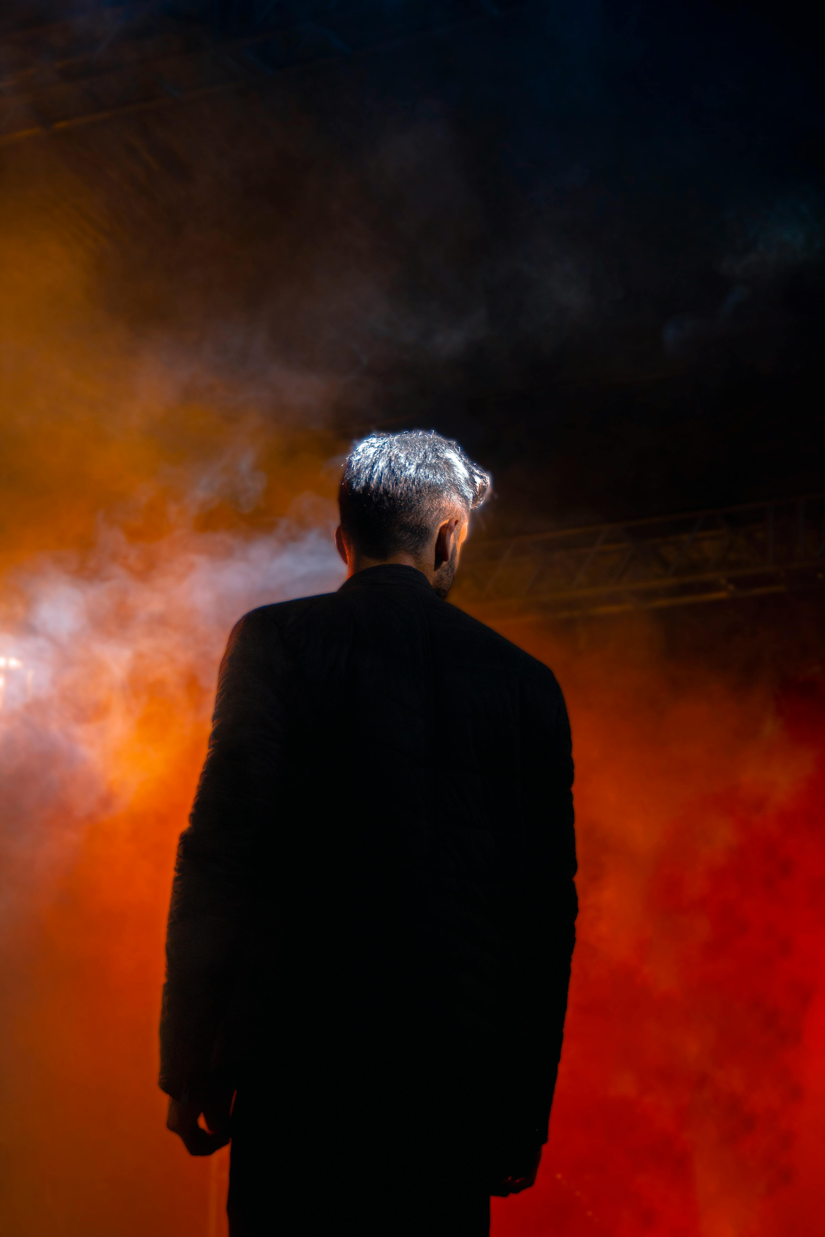 Back View of a Man Wearing Black Long Sleeves · Free Stock Photo