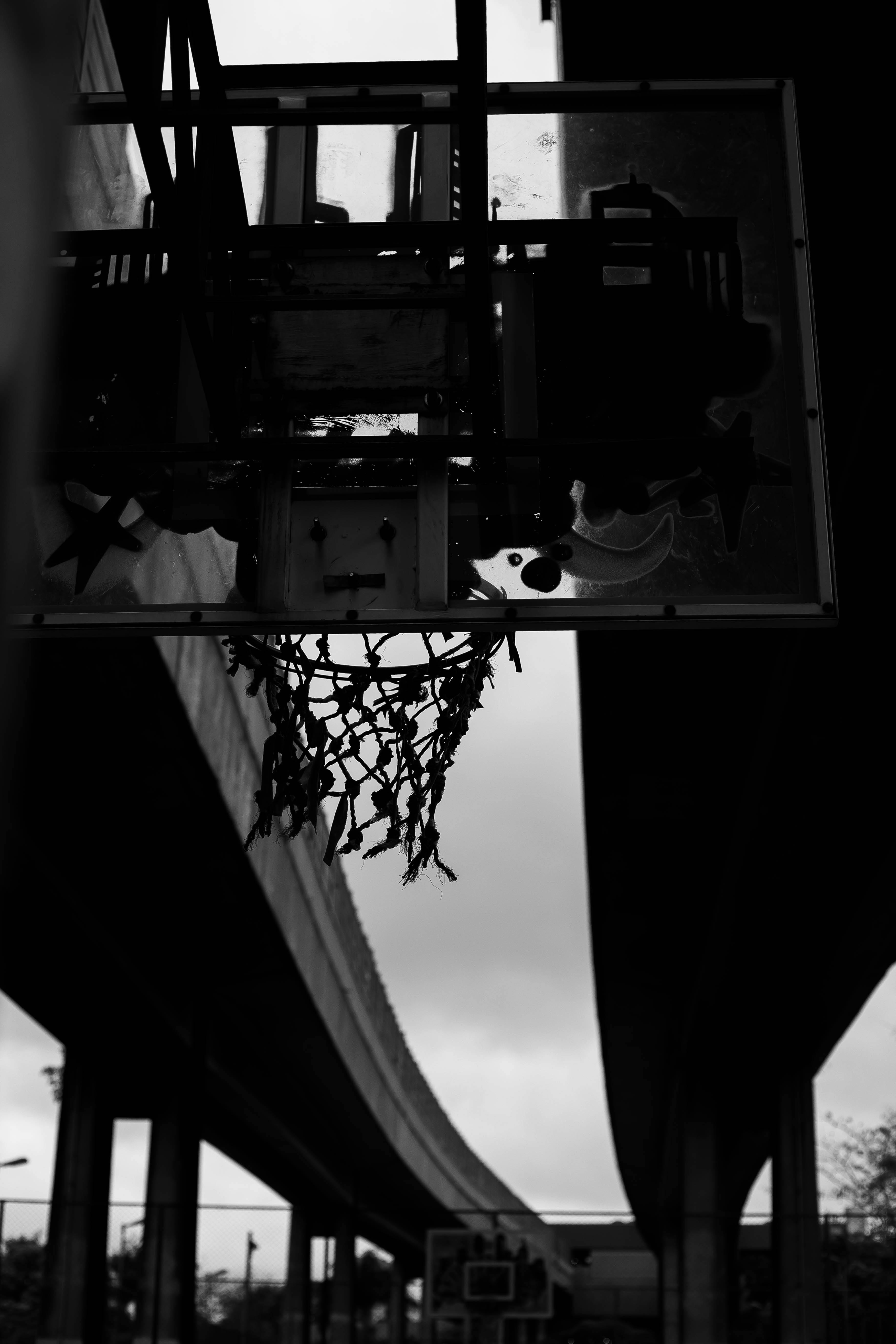 Grayscale Photo of Basketball Ring · Free Stock Photo