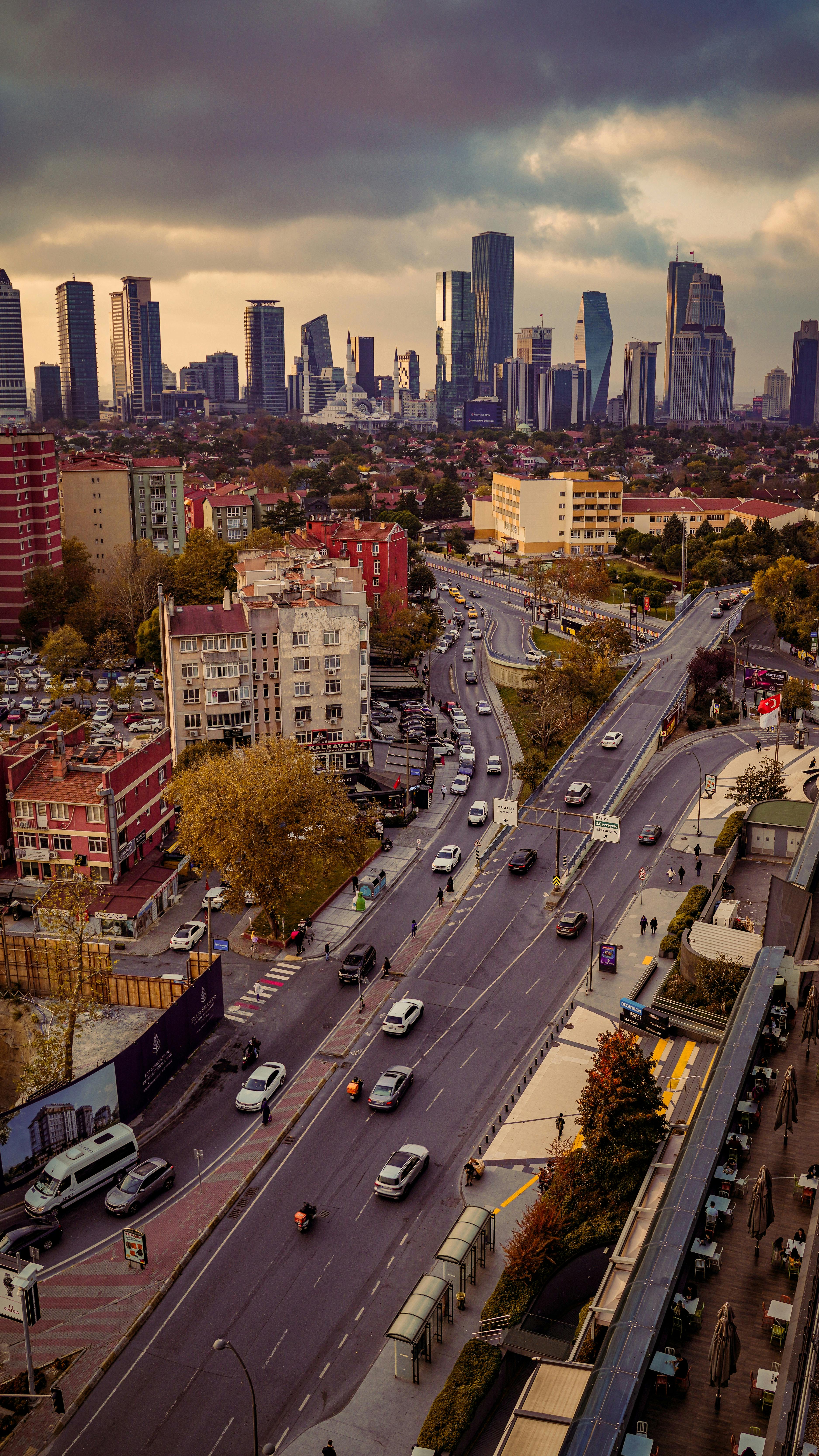 Aerial Photography of Cars on City Road near Buildings · Free Stock Photo
