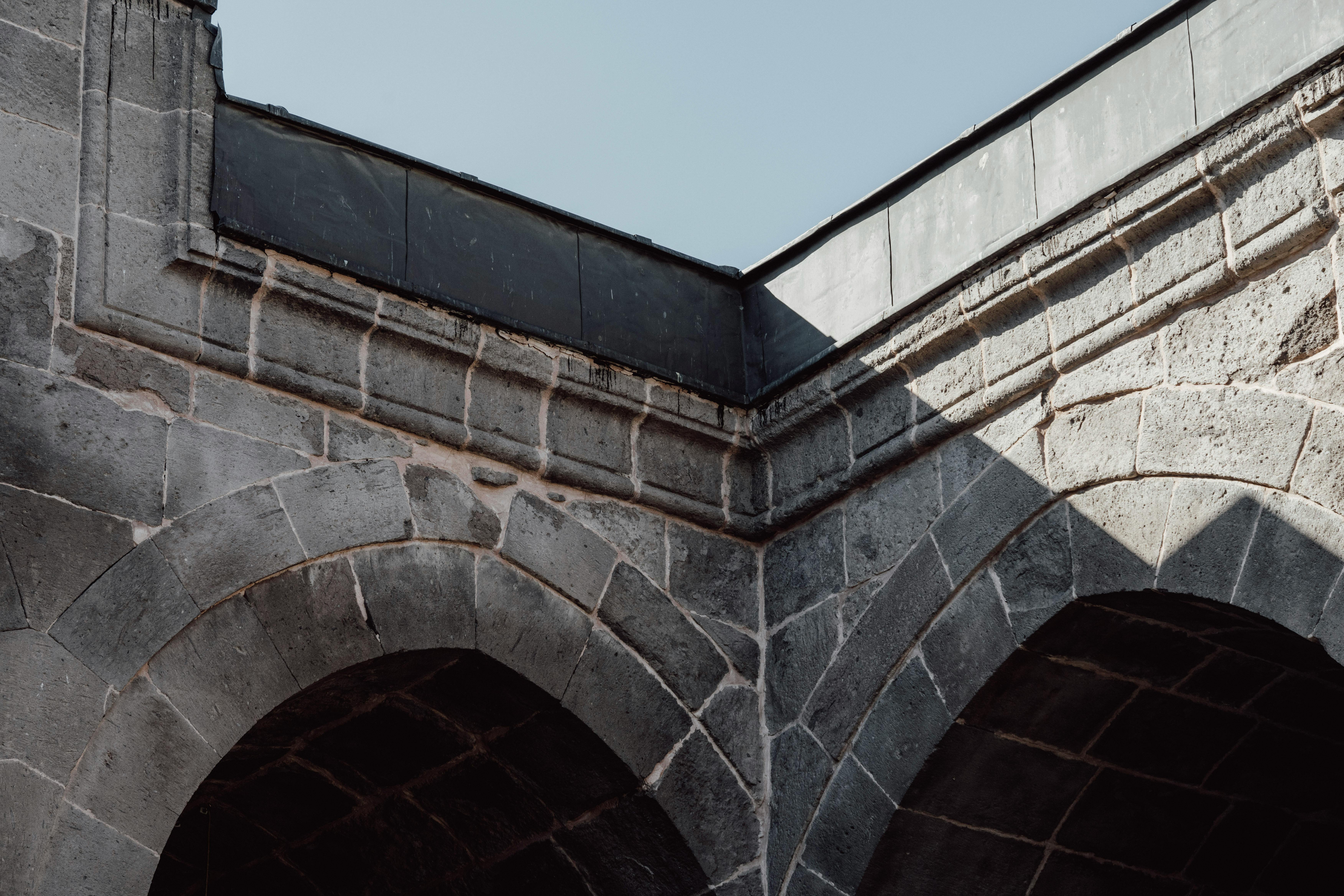 A Stone Building with Arches · Free Stock Photo