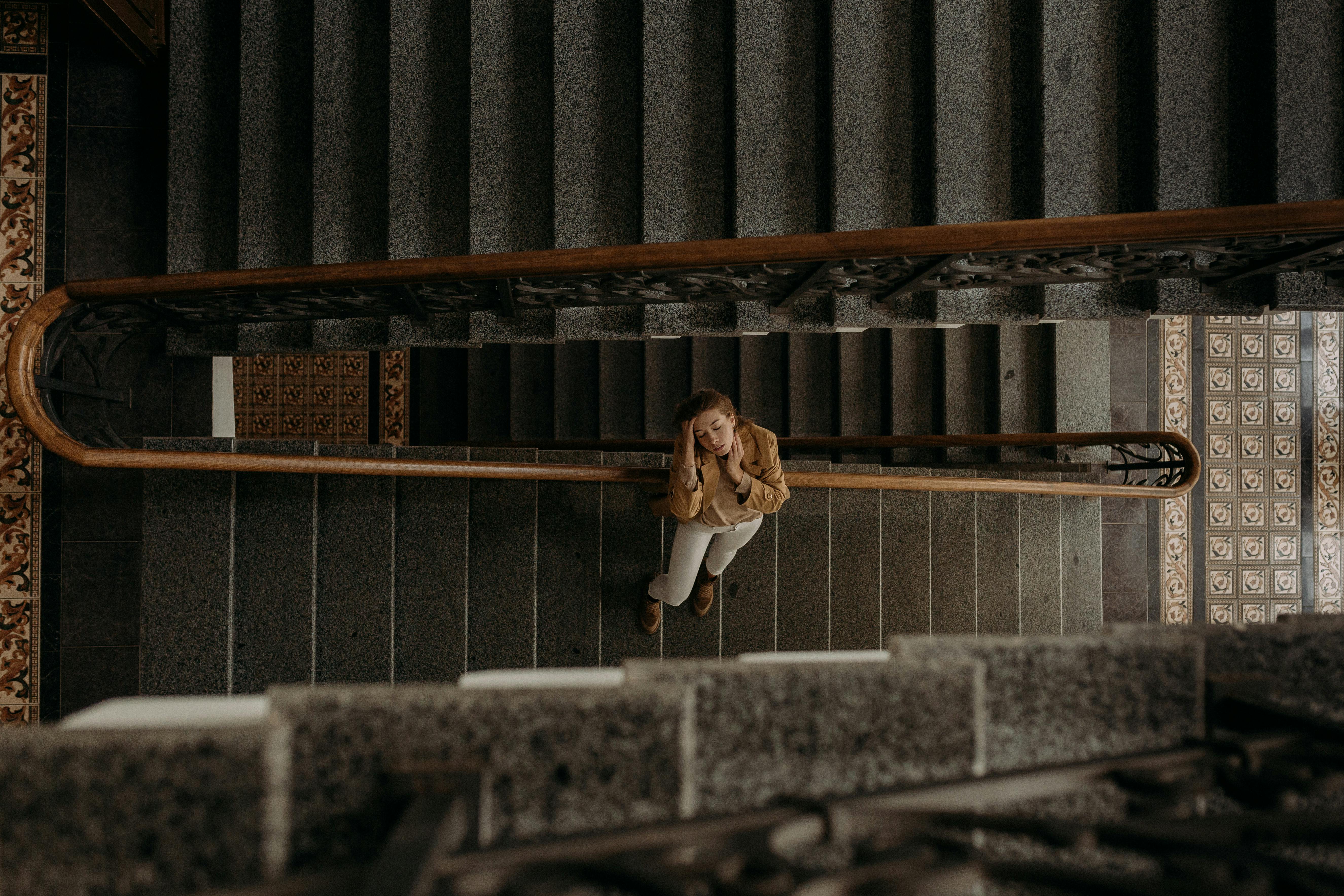 Woman Posing on Staircase · Free Stock Photo
