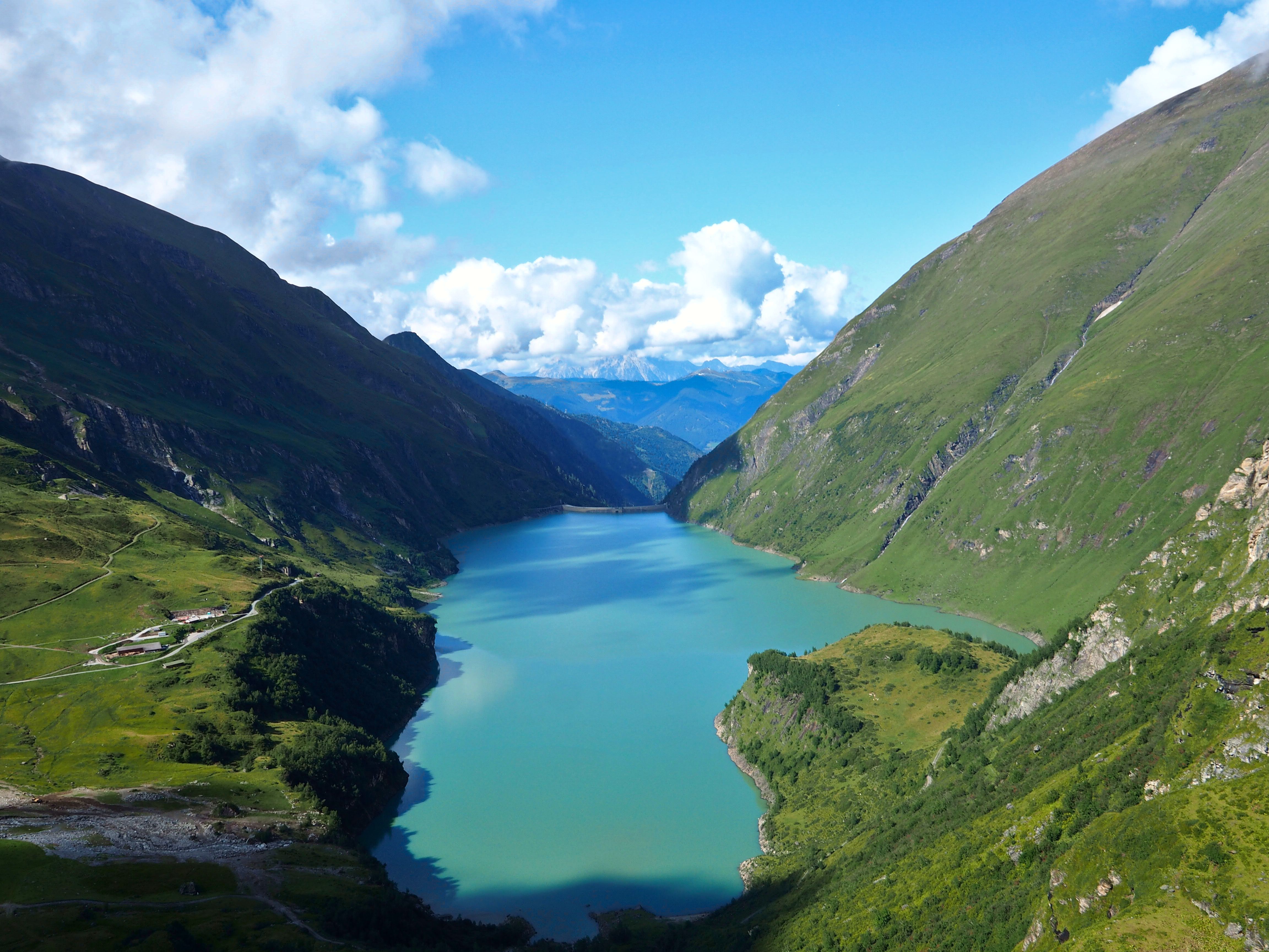 A River Between Green Mountains · Free Stock Photo