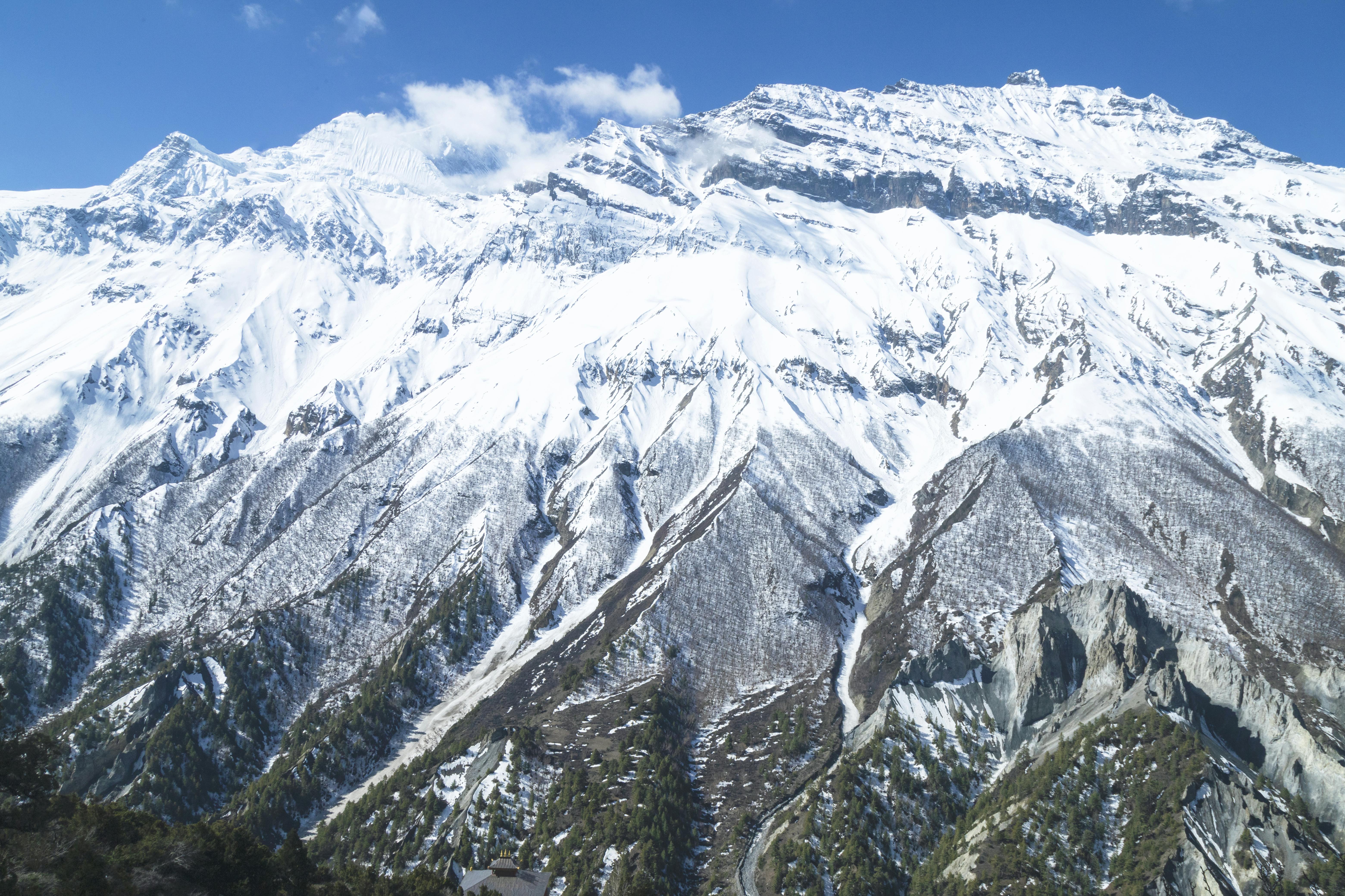 A Majestic Snow-Covered Mountain · Free Stock Photo