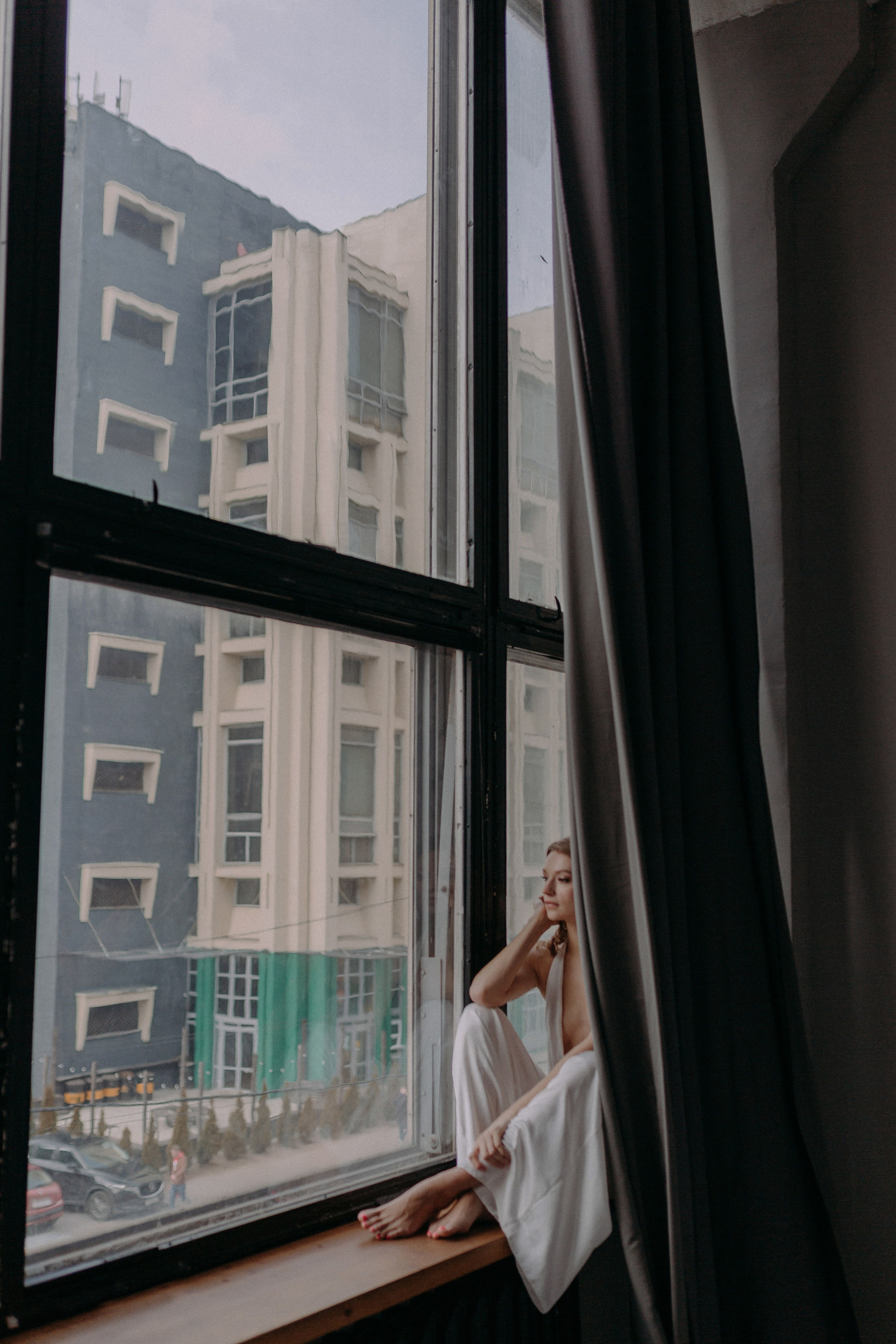 Woman Sitting By Window Photos, Download The BEST Free Woman Sitting By ...