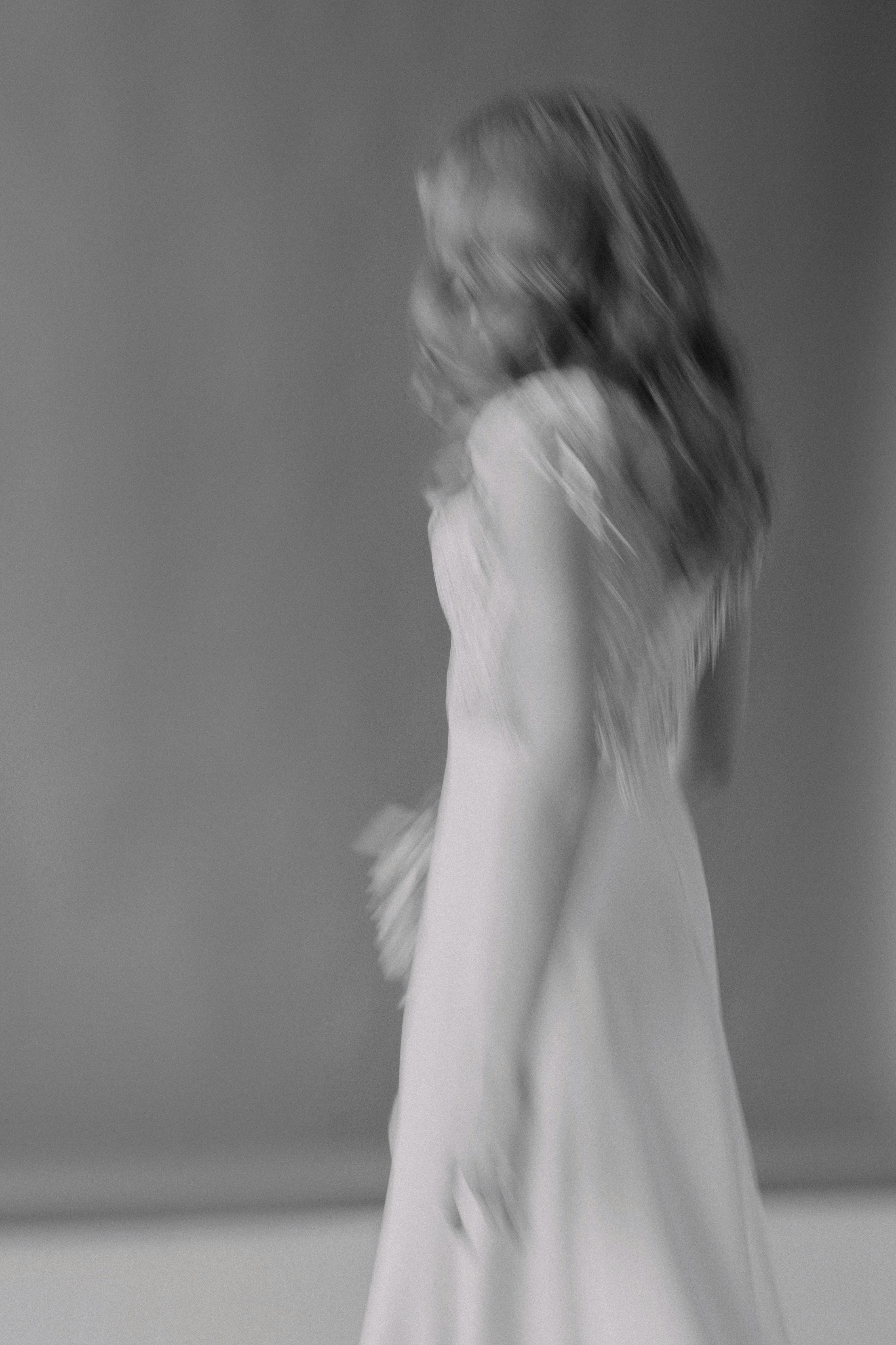 Blurred Picture of Woman Moving · Free Stock Photo