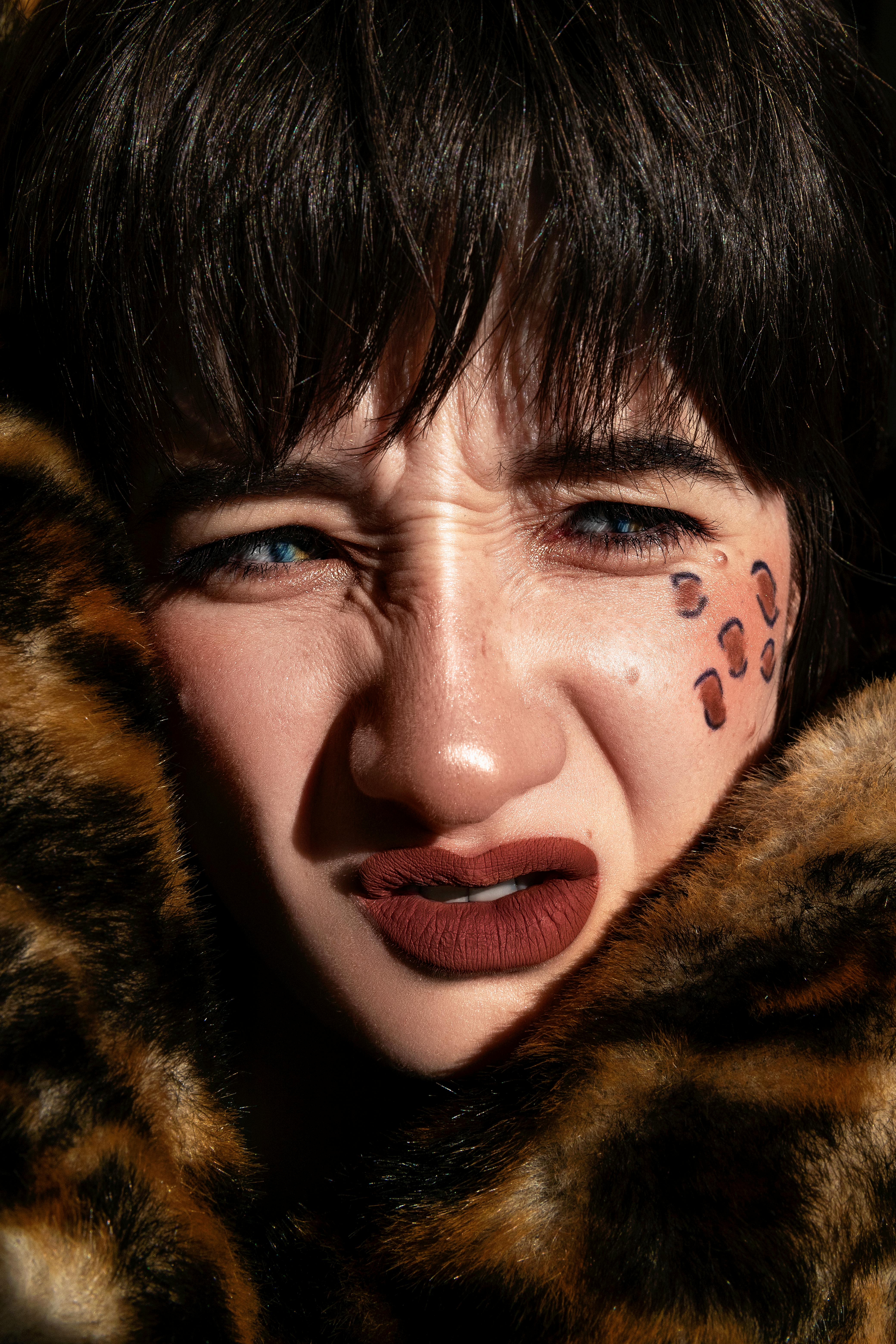 A Portrait of a Woman with a Confused Facial Expression · Free Stock Photo