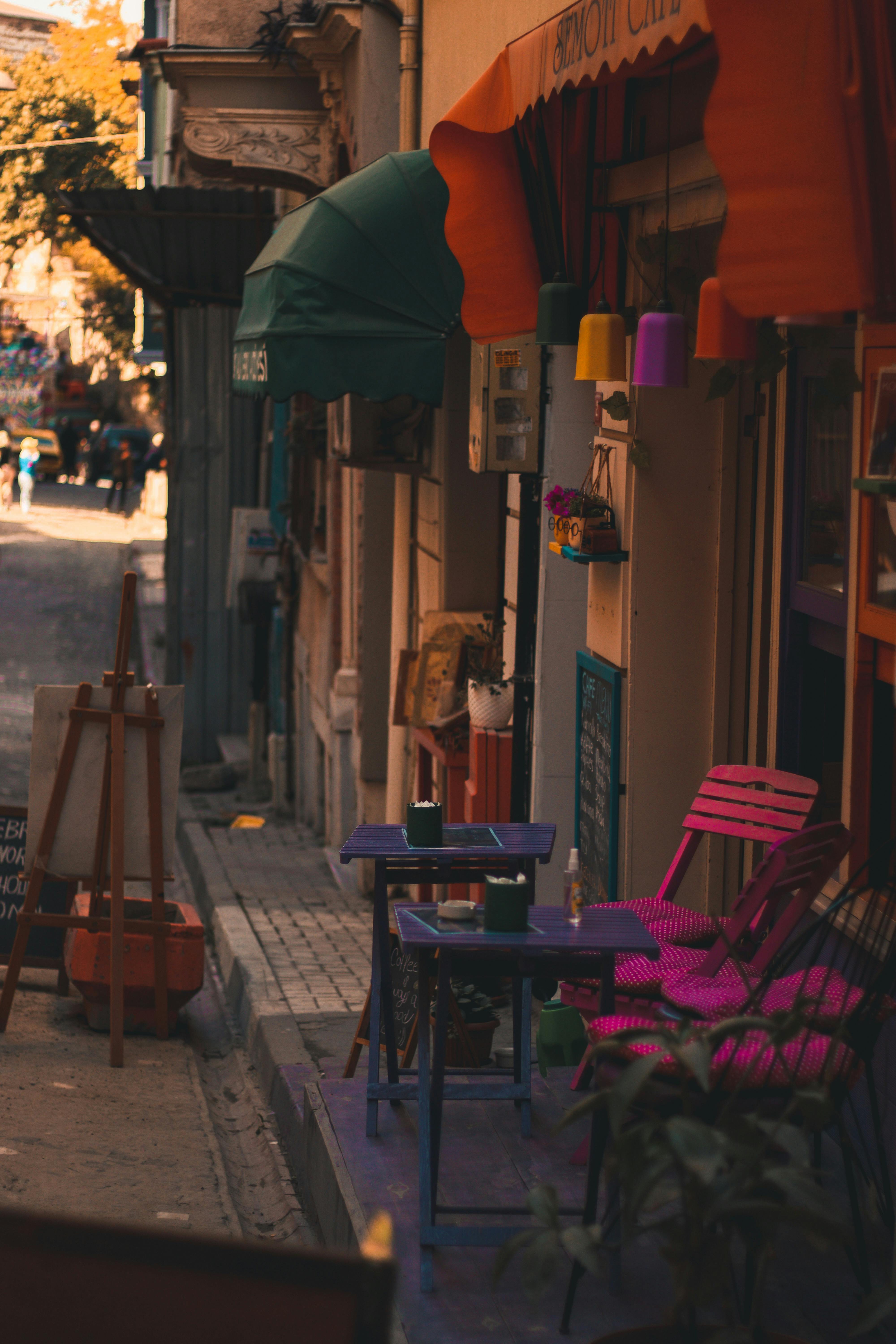 Storefronts with Canopy on the Sidewalk · Free Stock Photo