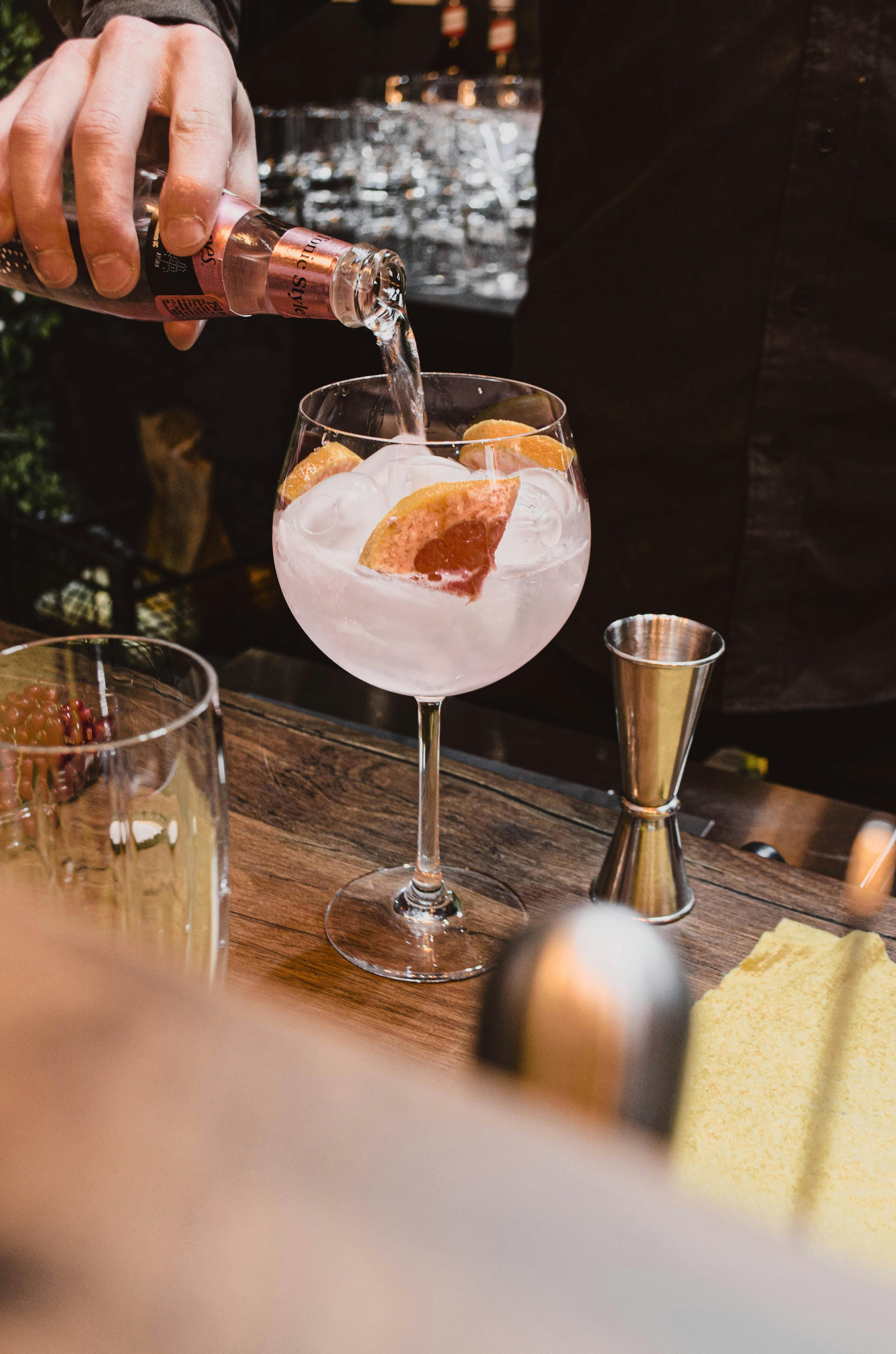 Bartender Pouring Drink · Free Stock Photo