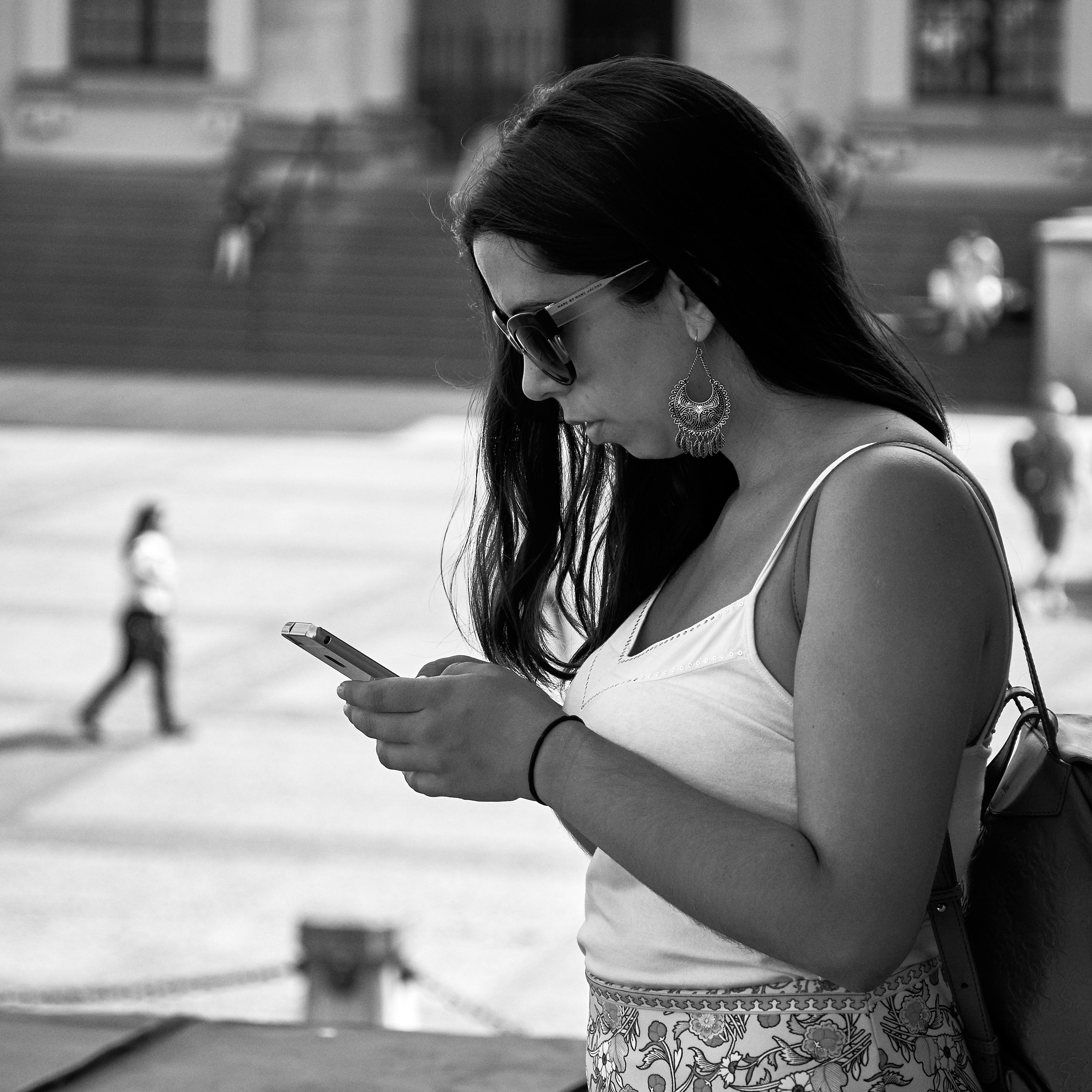 Woman using a Smartphone · Free Stock Photo