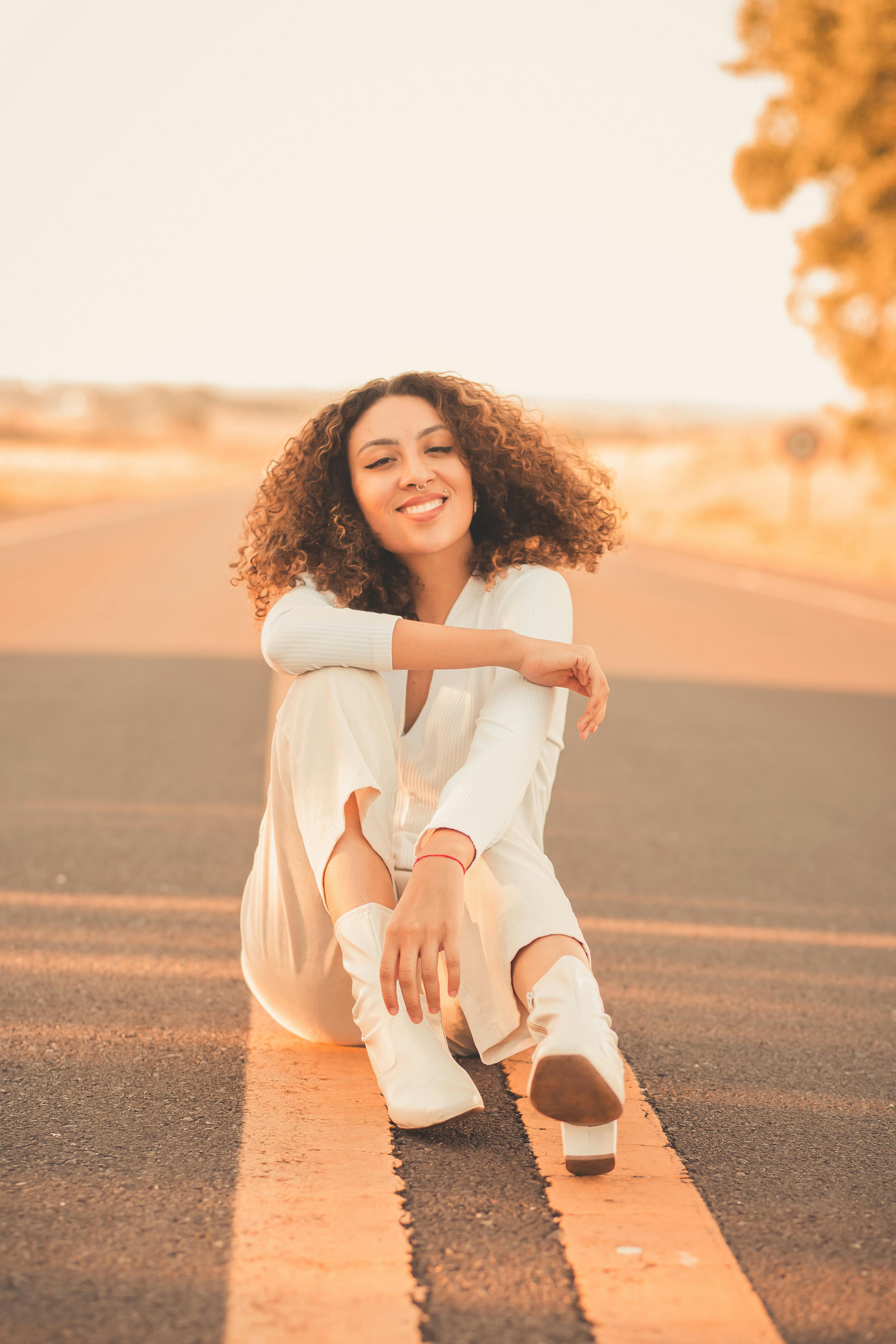 Smiling Woman Wearing Clothes · Free Stock Photo