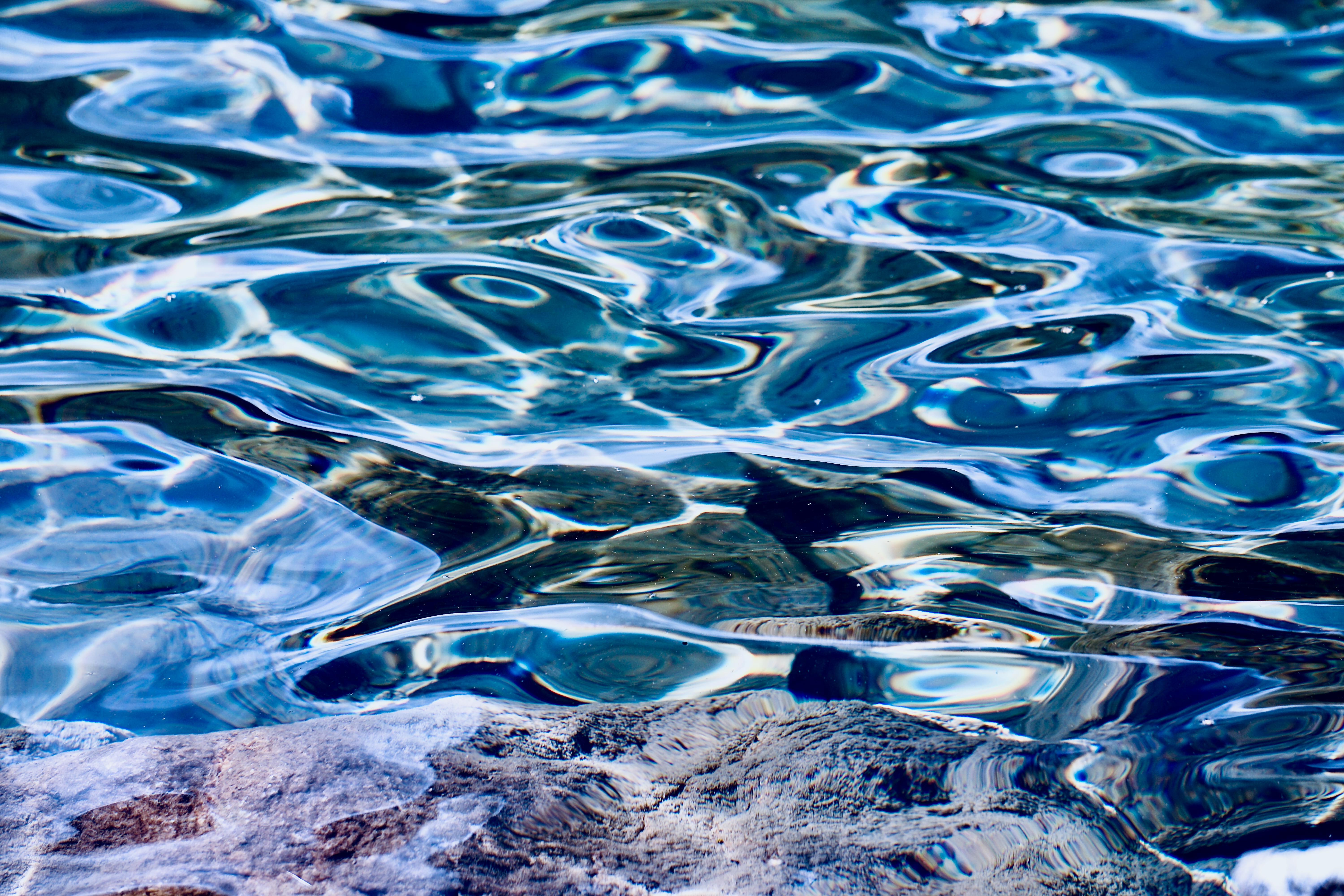 Close up of Blue Water and Rock · Free Stock Photo