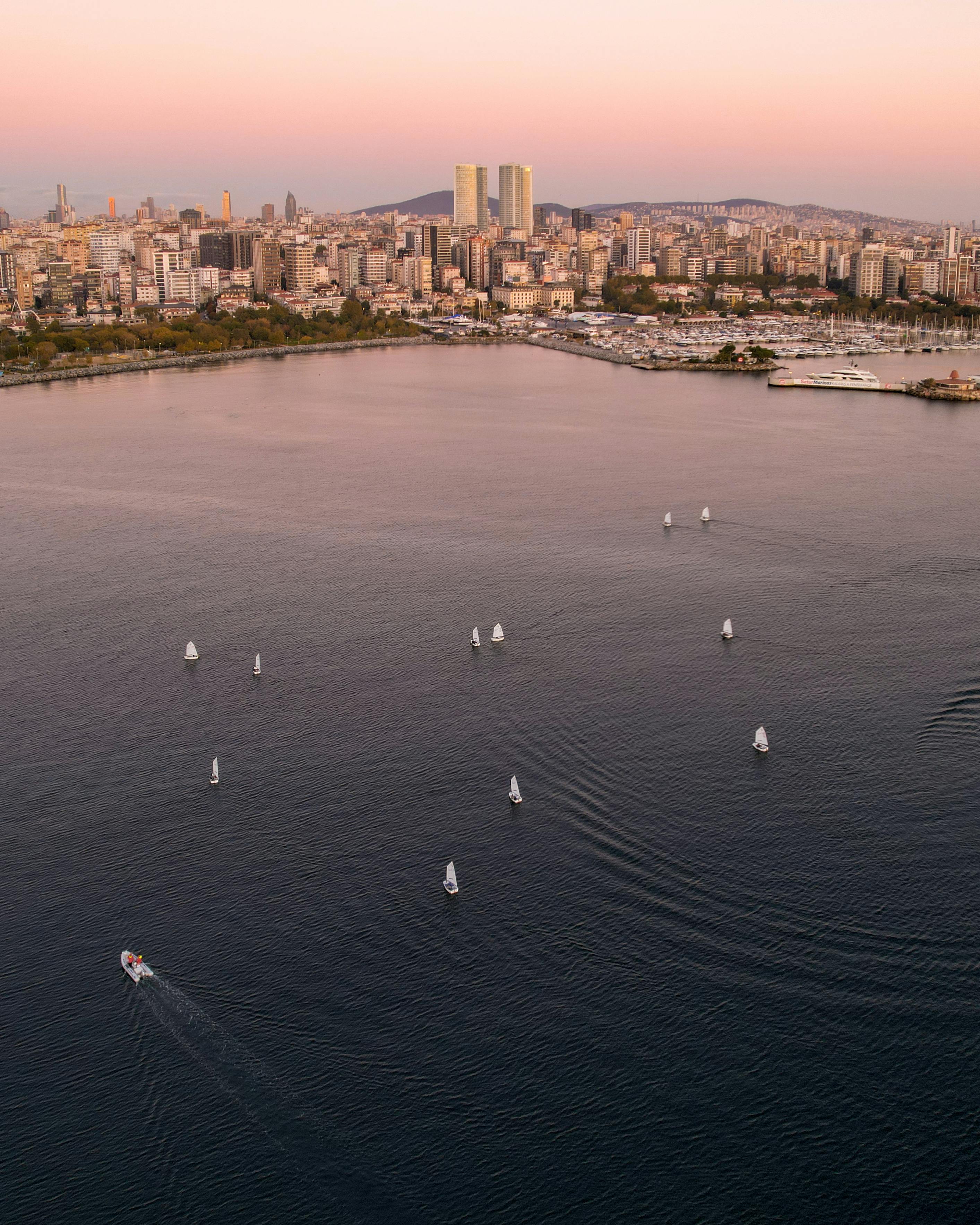 Aerial Photography of City Buildings near Ocean · Free Stock Photo