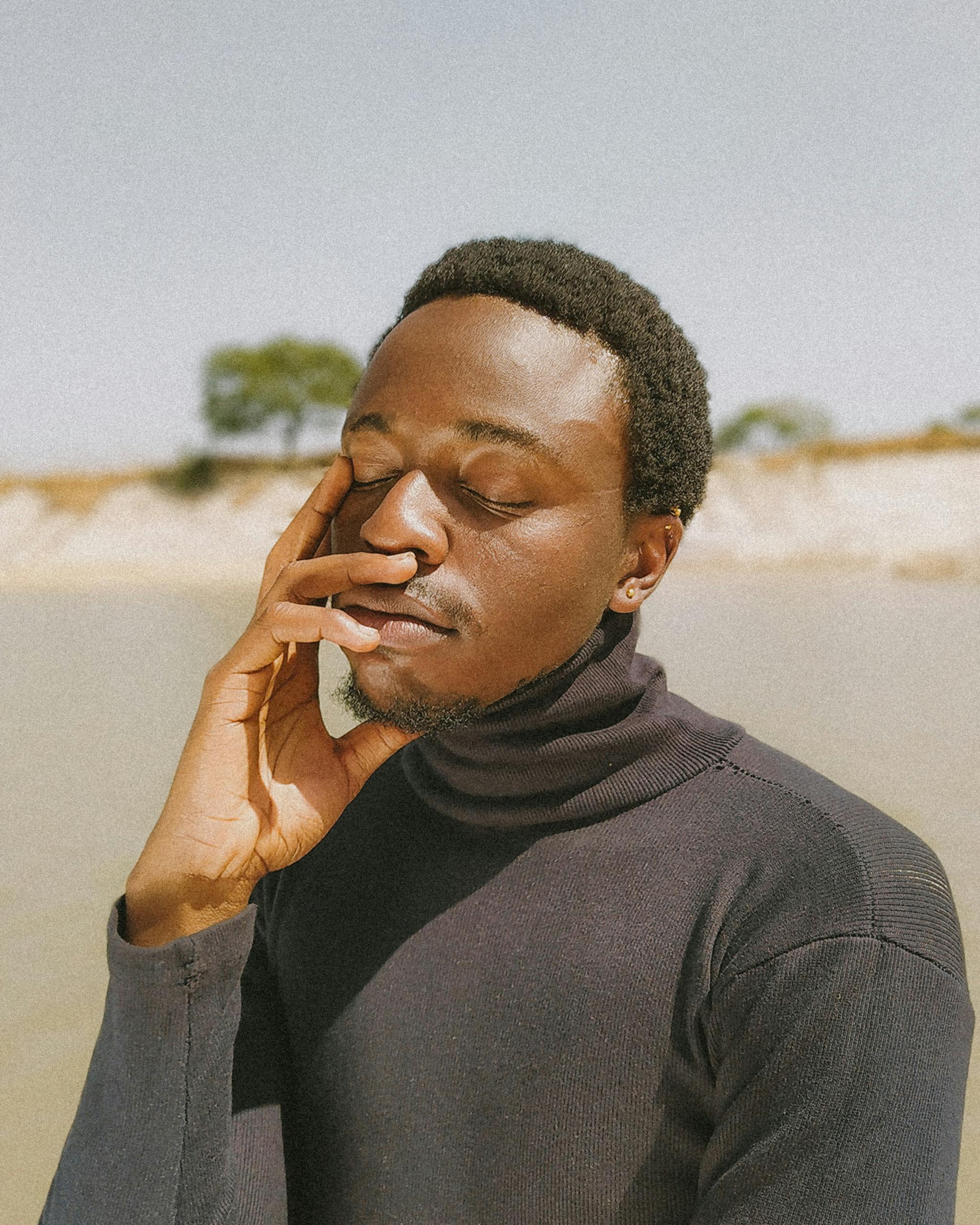 Man in White Shirt Doing Peace Sign · Free Stock Photo