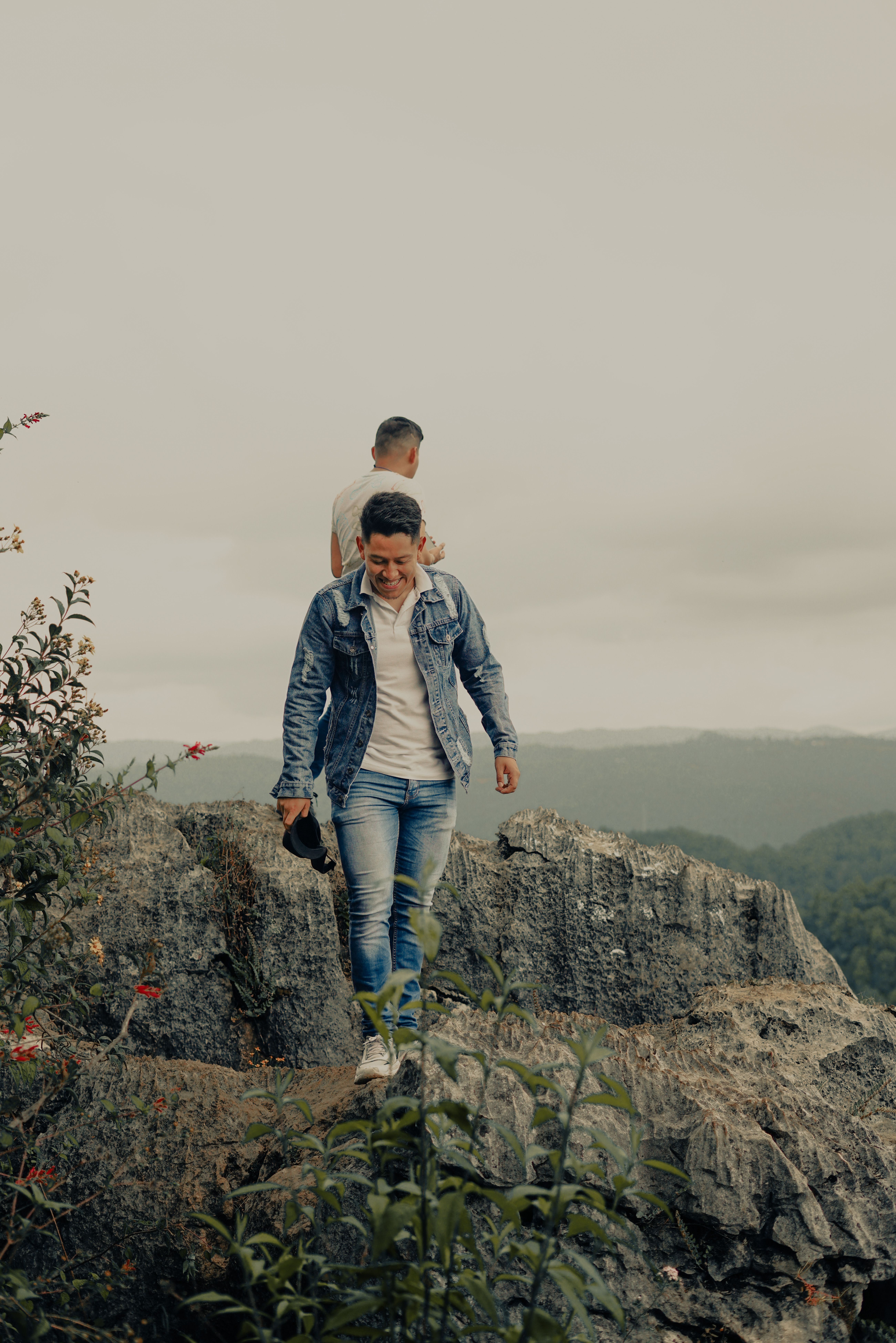 A Man Walking on the Rock Formation · Free Stock Photo