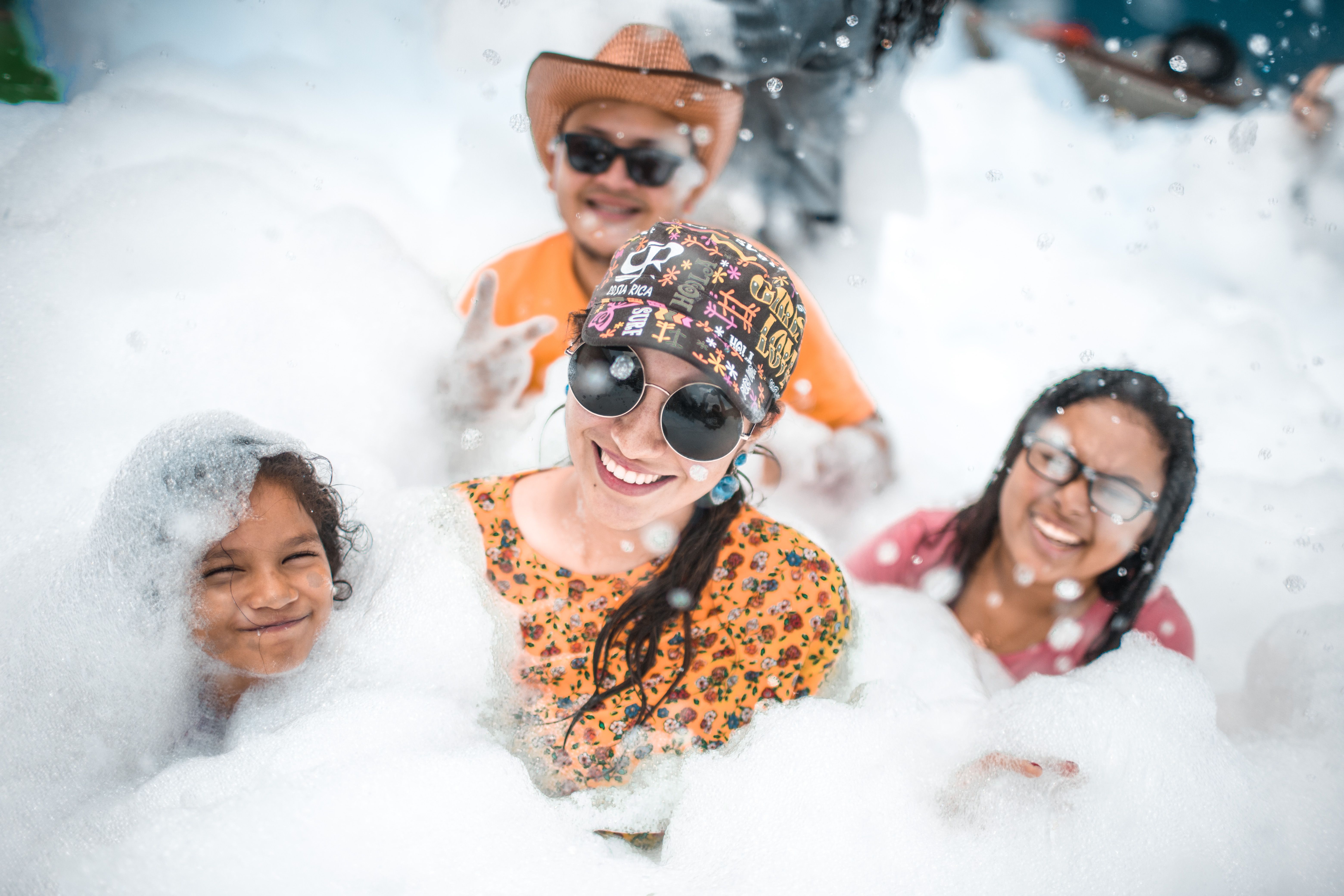A Woman Covered in Bubbles · Free Stock Photo