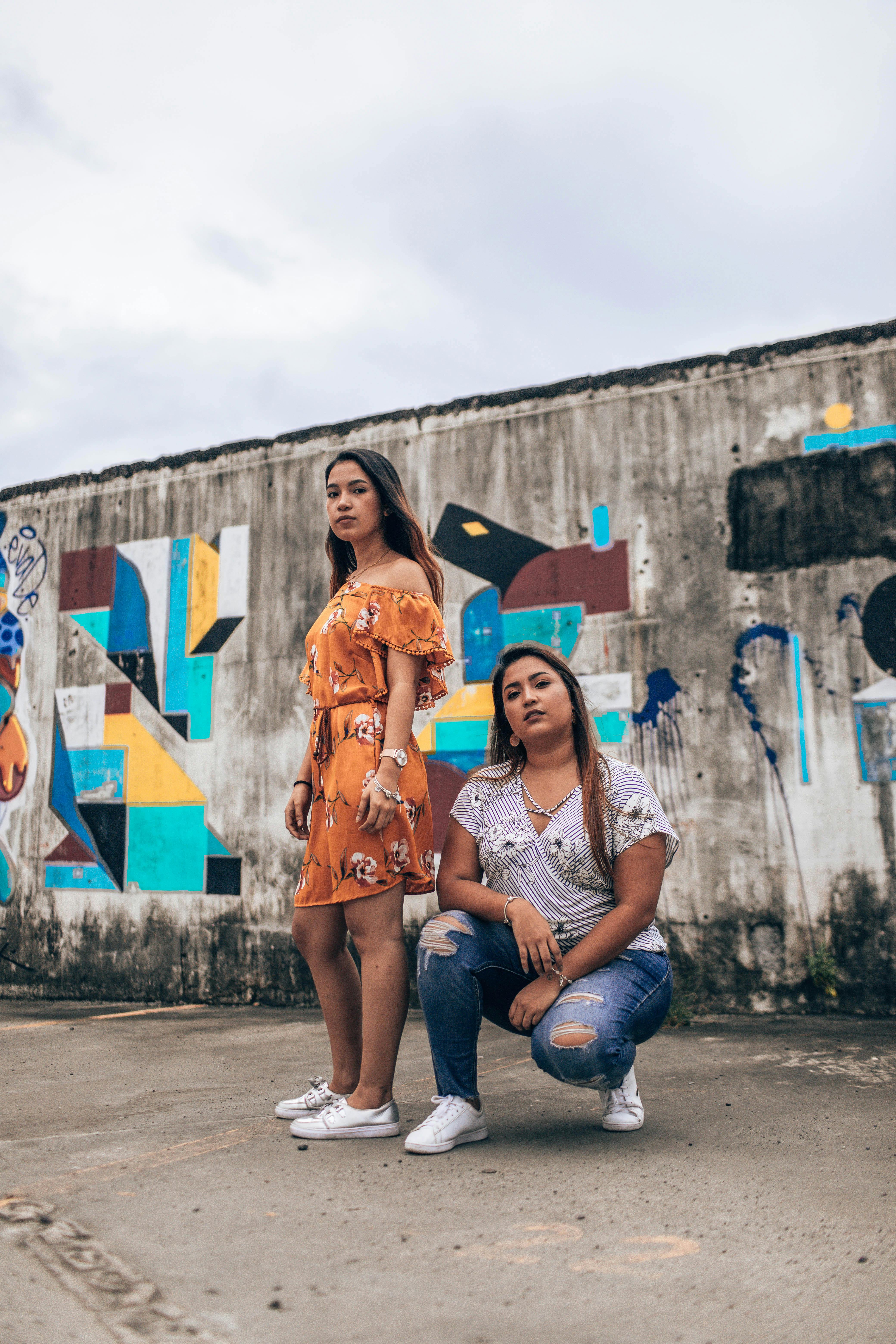 Two Women on Posing Together · Free Stock Photo