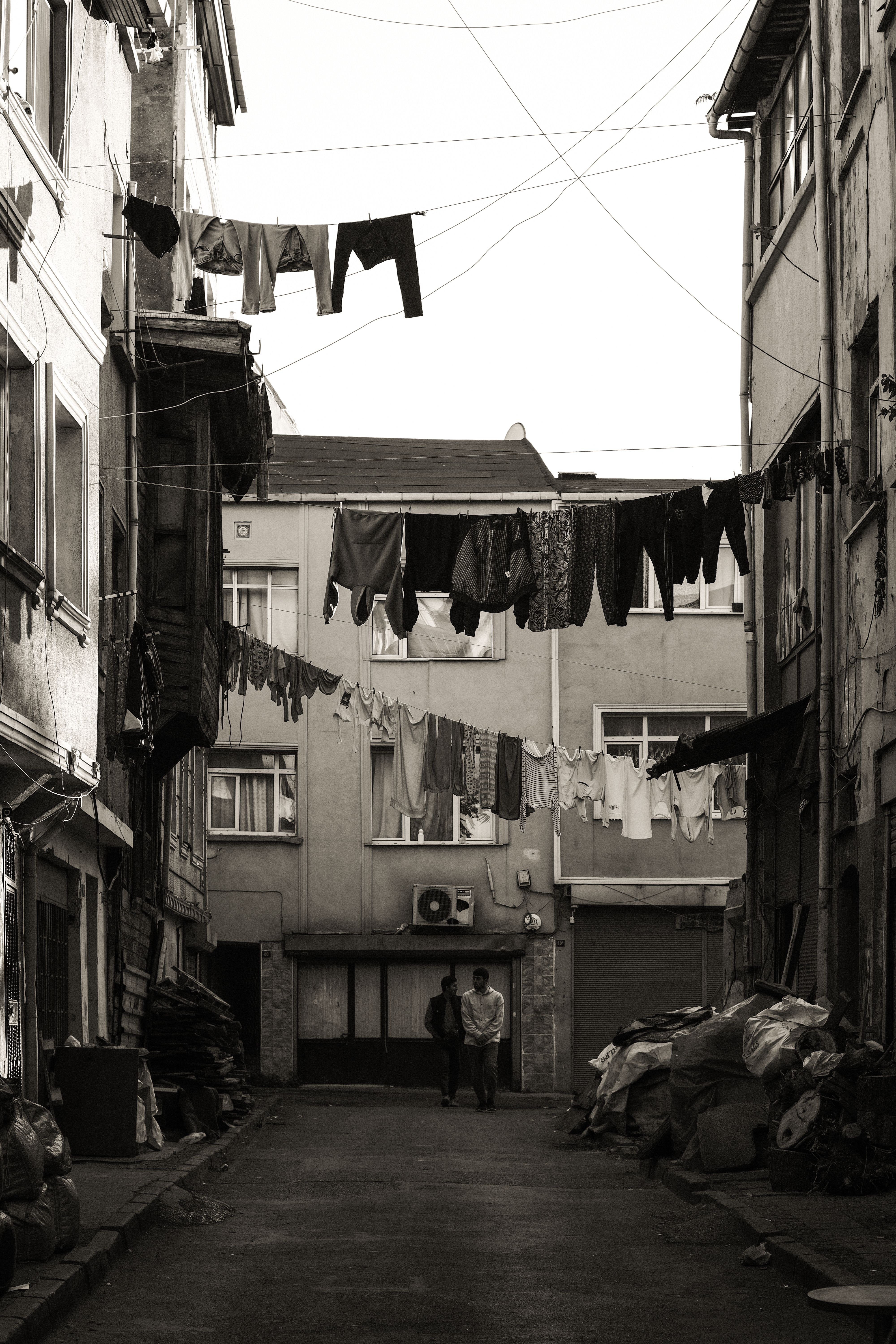 Laundry Hanging on Clotheslines between Houses on a Narrow Street ...