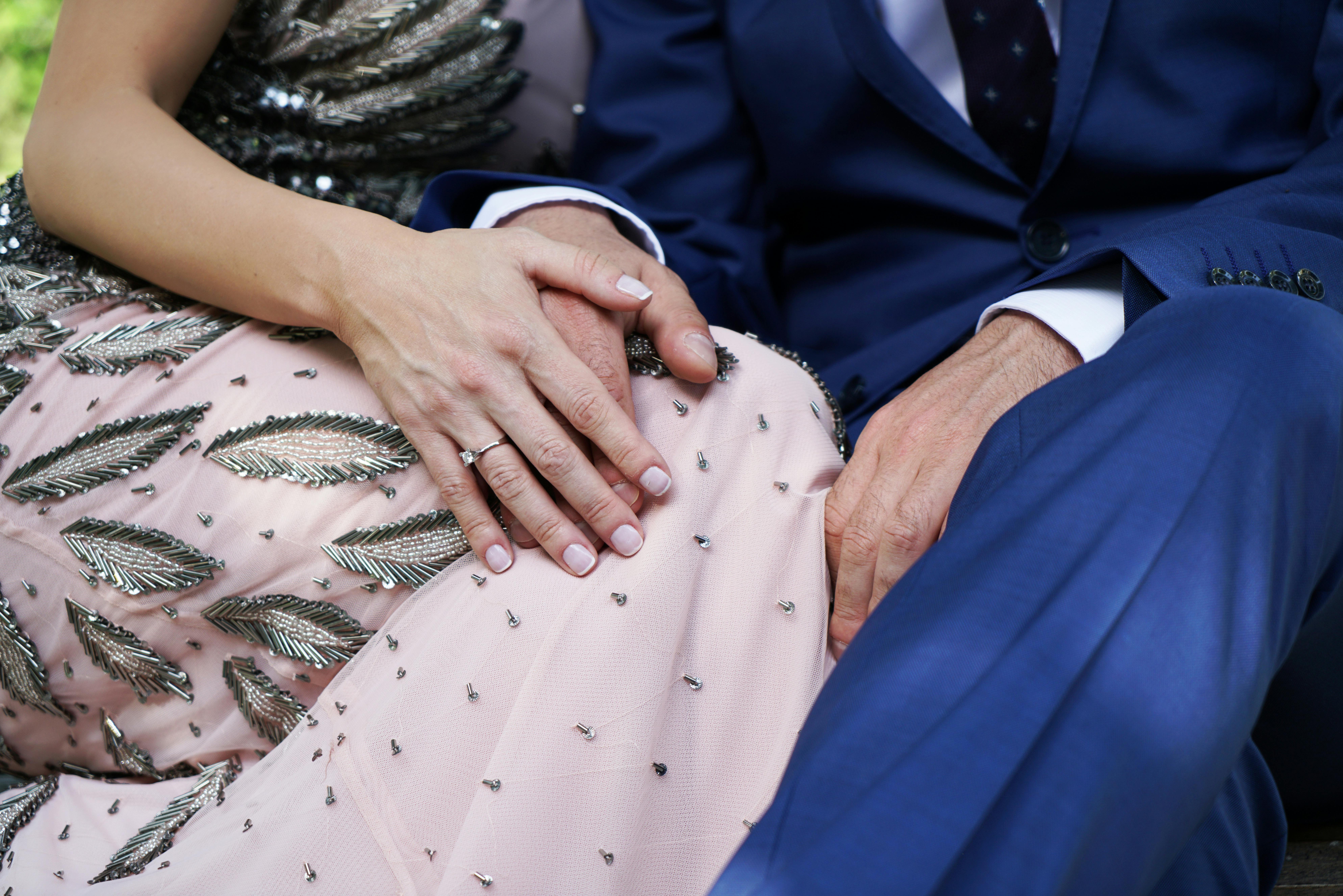 Woman Holding Man's Hand · Free Stock Photo