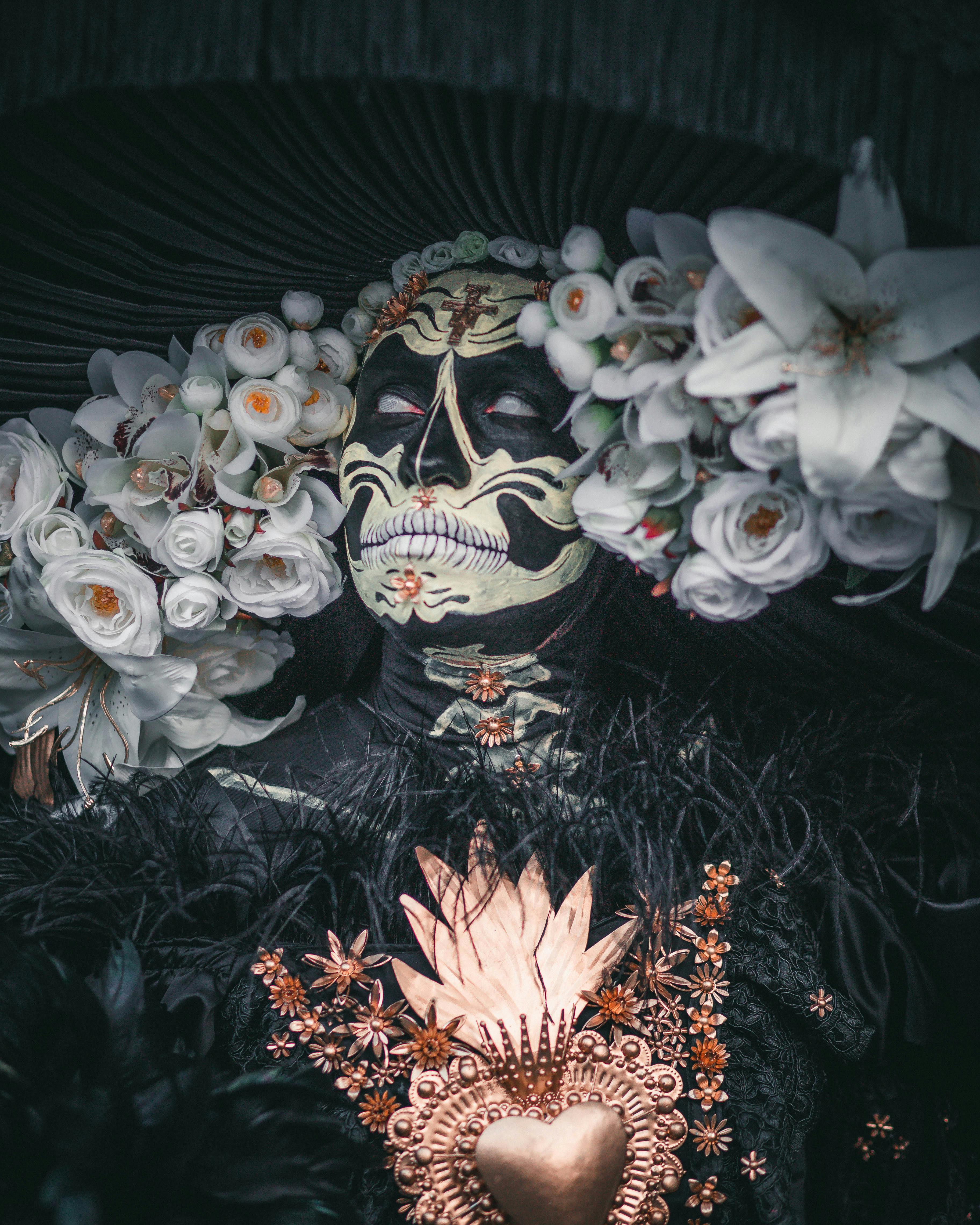Mexican girl dressed as a catrina with a black suit and detailed skull ...