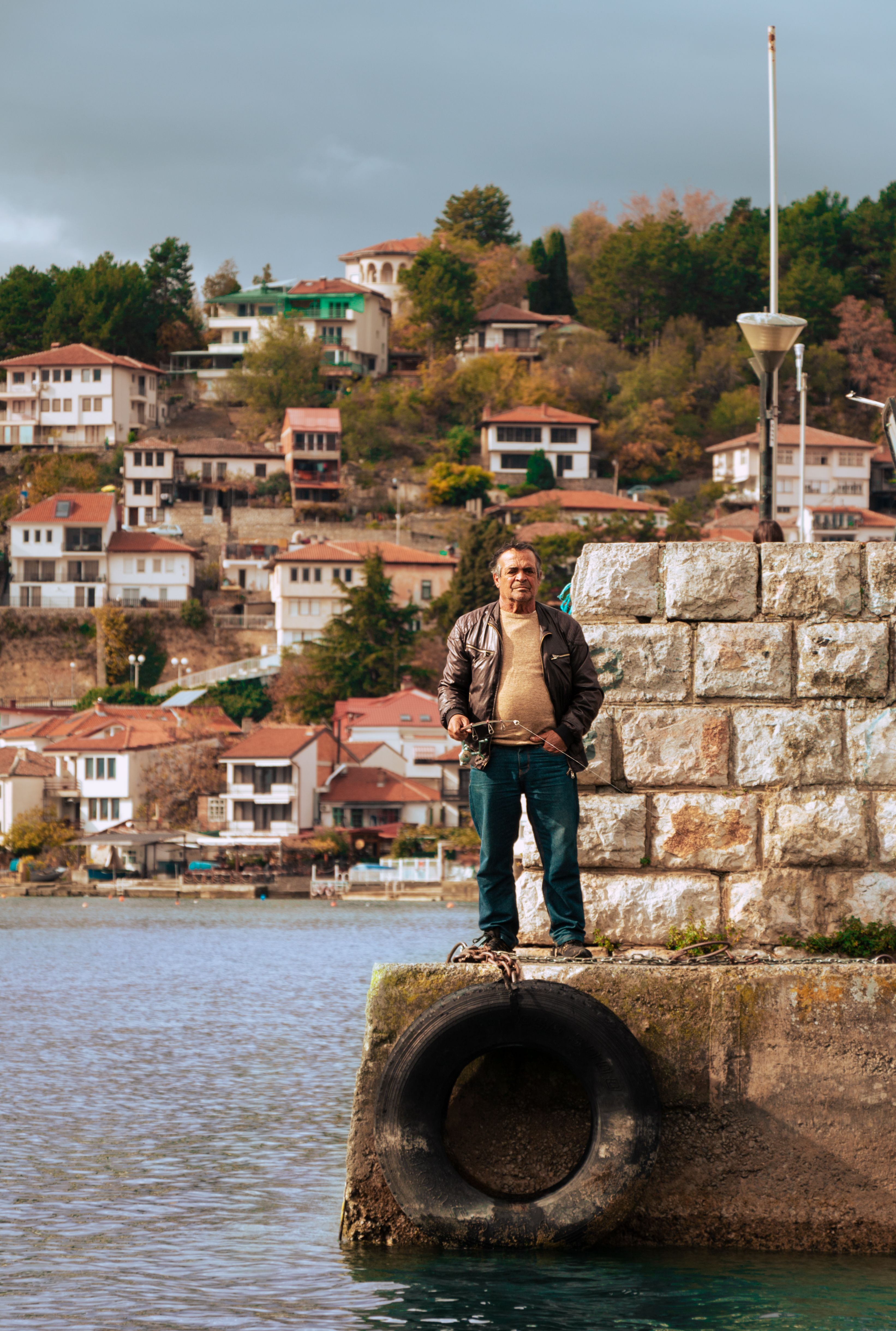 A Man Fishing on the Shore · Free Stock Photo