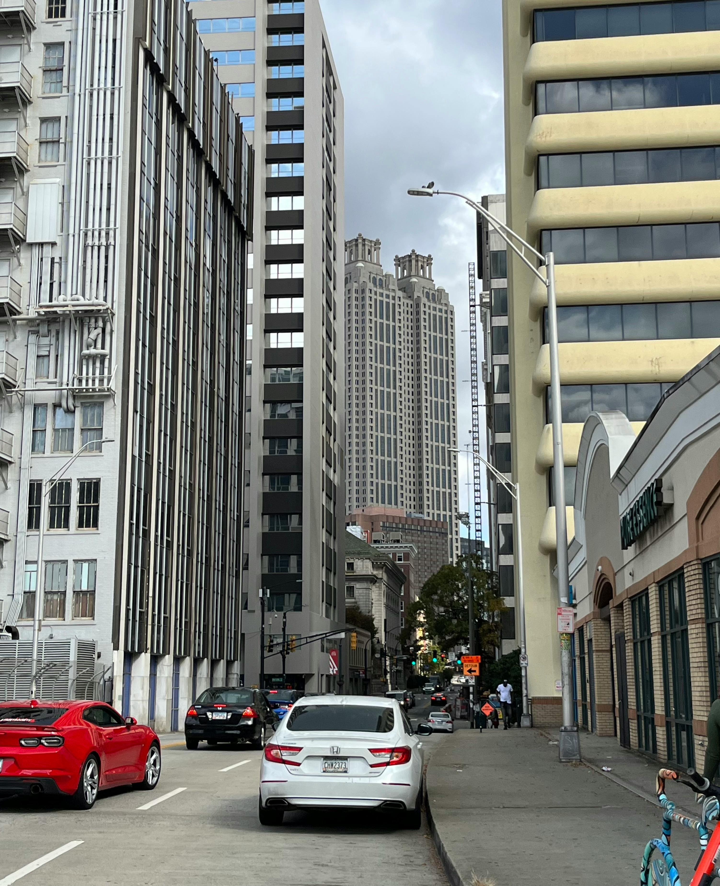 Cars on Road Near High Rise Buildings · Free Stock Photo