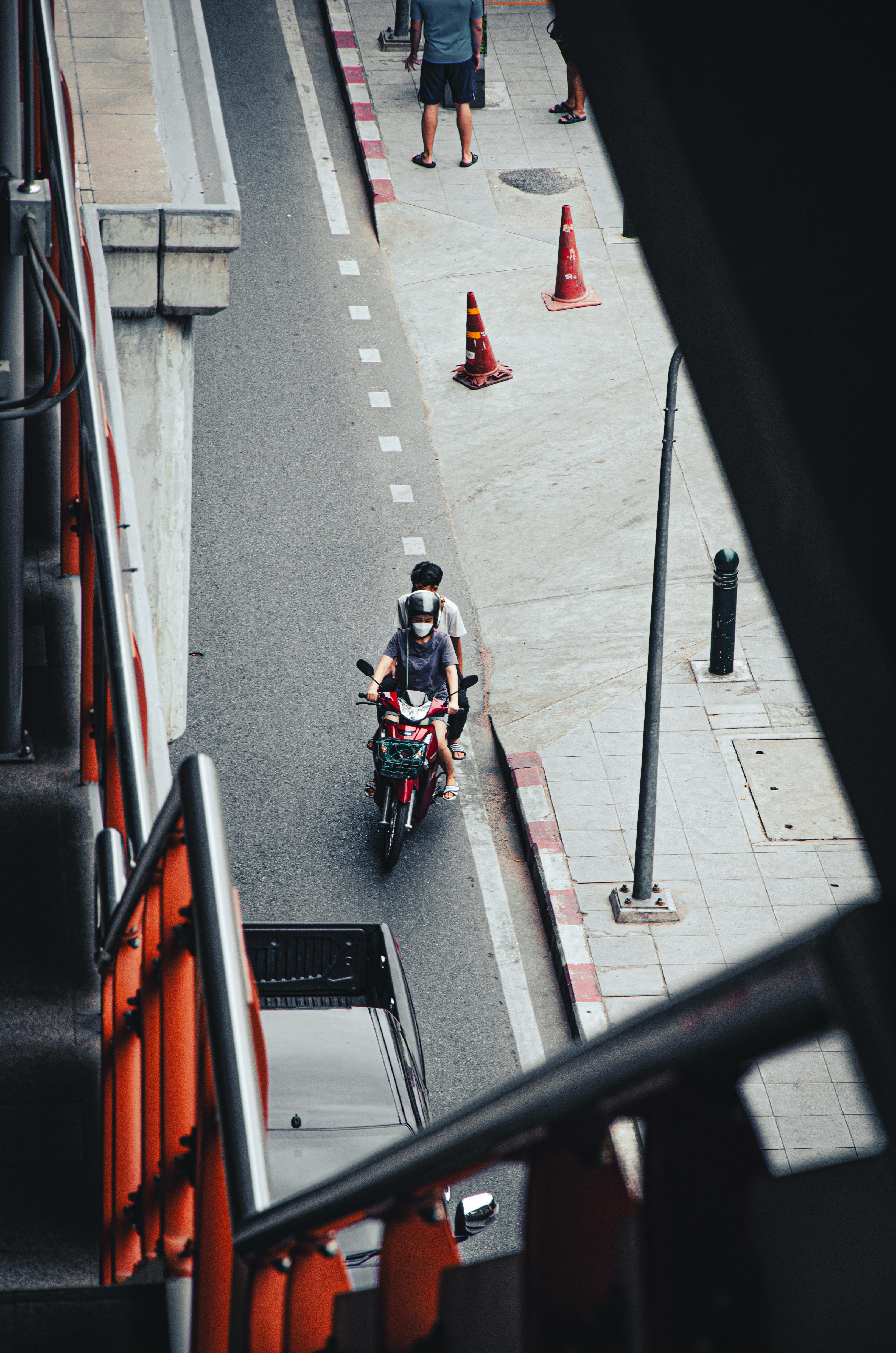 People Riding Motorcycle on Road · Free Stock Photo