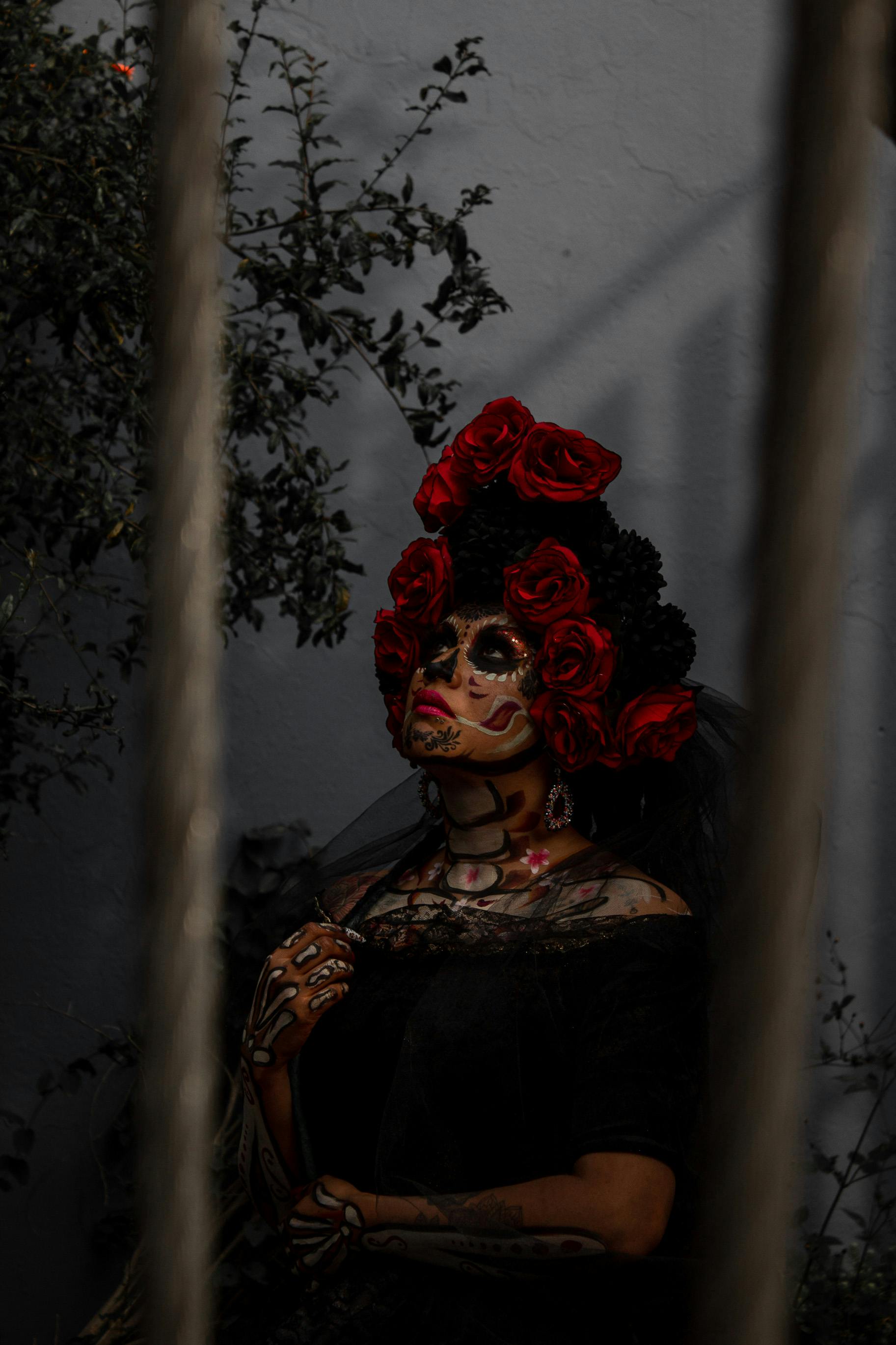 Woman Posing as Catrina Looking Up · Free Stock Photo