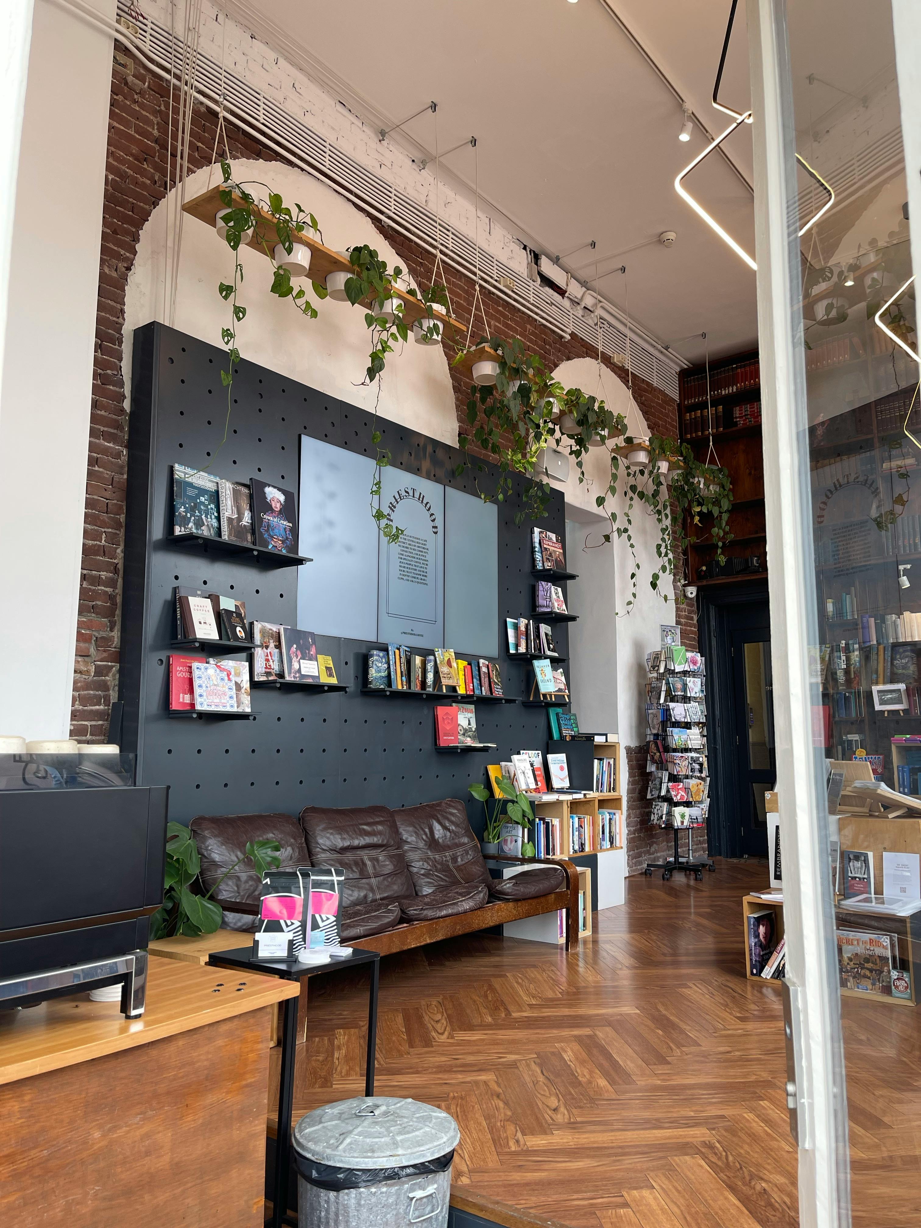 Interior of Bookshop with Books and Paintings · Free Stock Photo