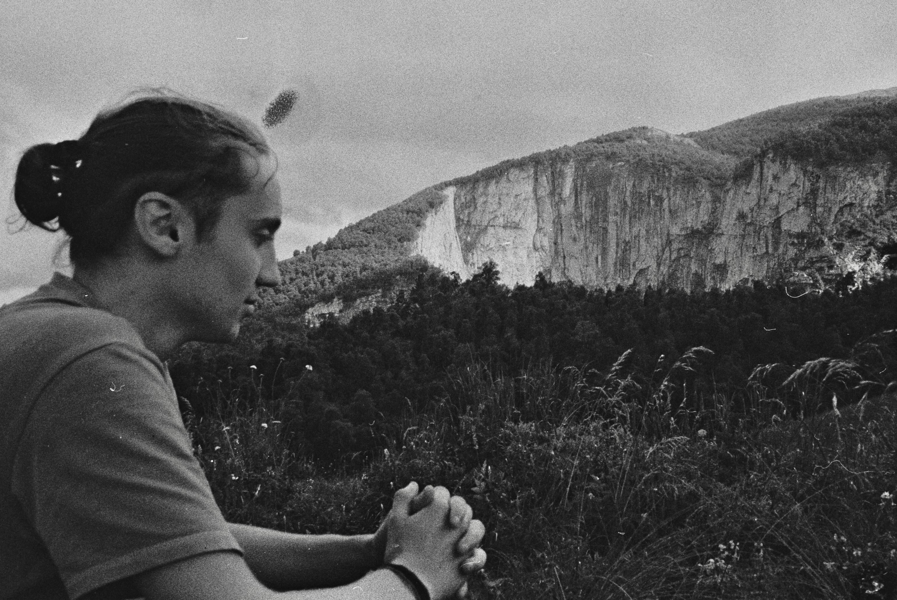 Grayscale Photography of Man Holding Smartphone · Free Stock Photo