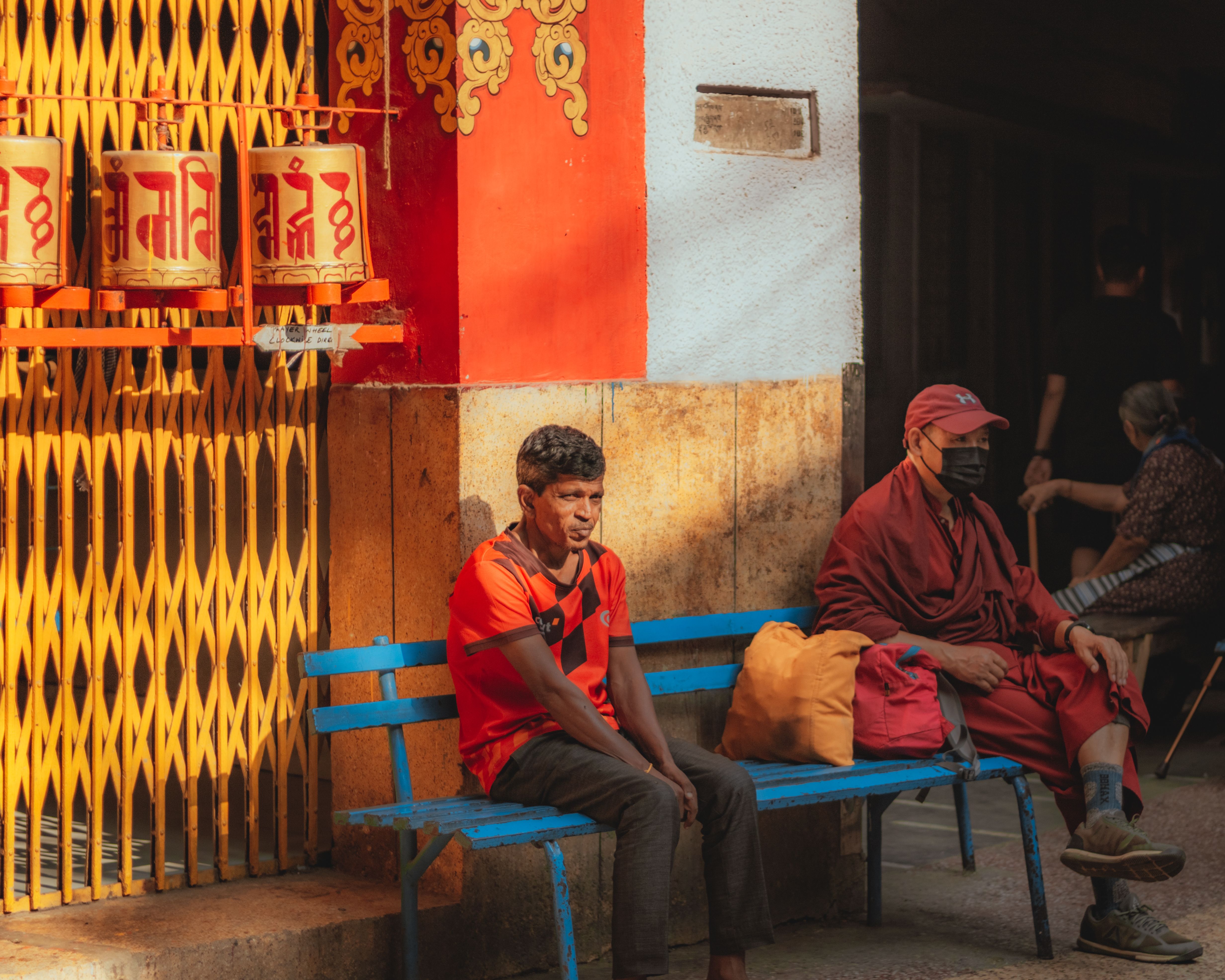 Two Men Waiting on a Bench · Free Stock Photo