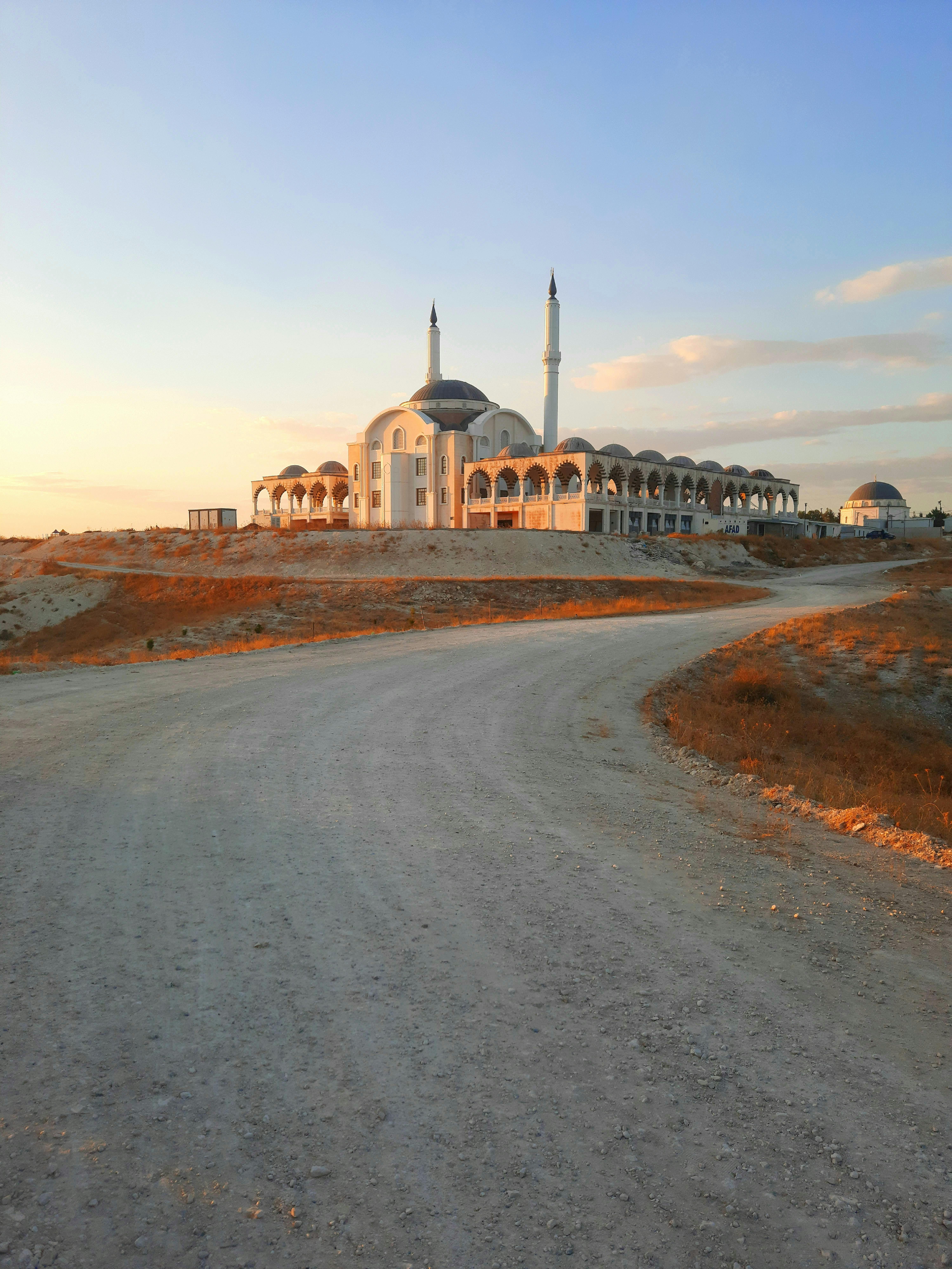 Mosque on a Desert at Sunset · Free Stock Photo